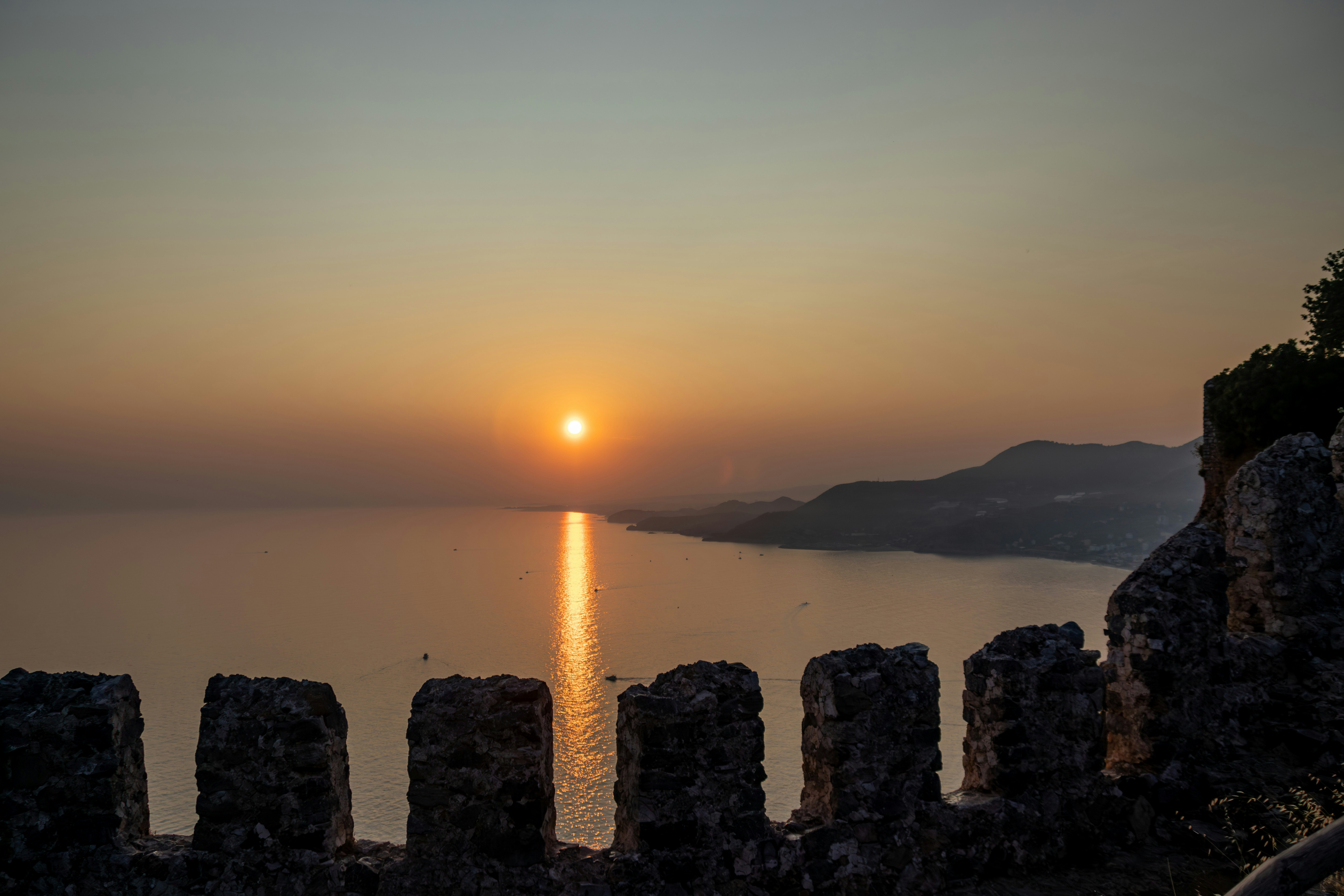 Twilight's Embrace: A Coastal Sunset