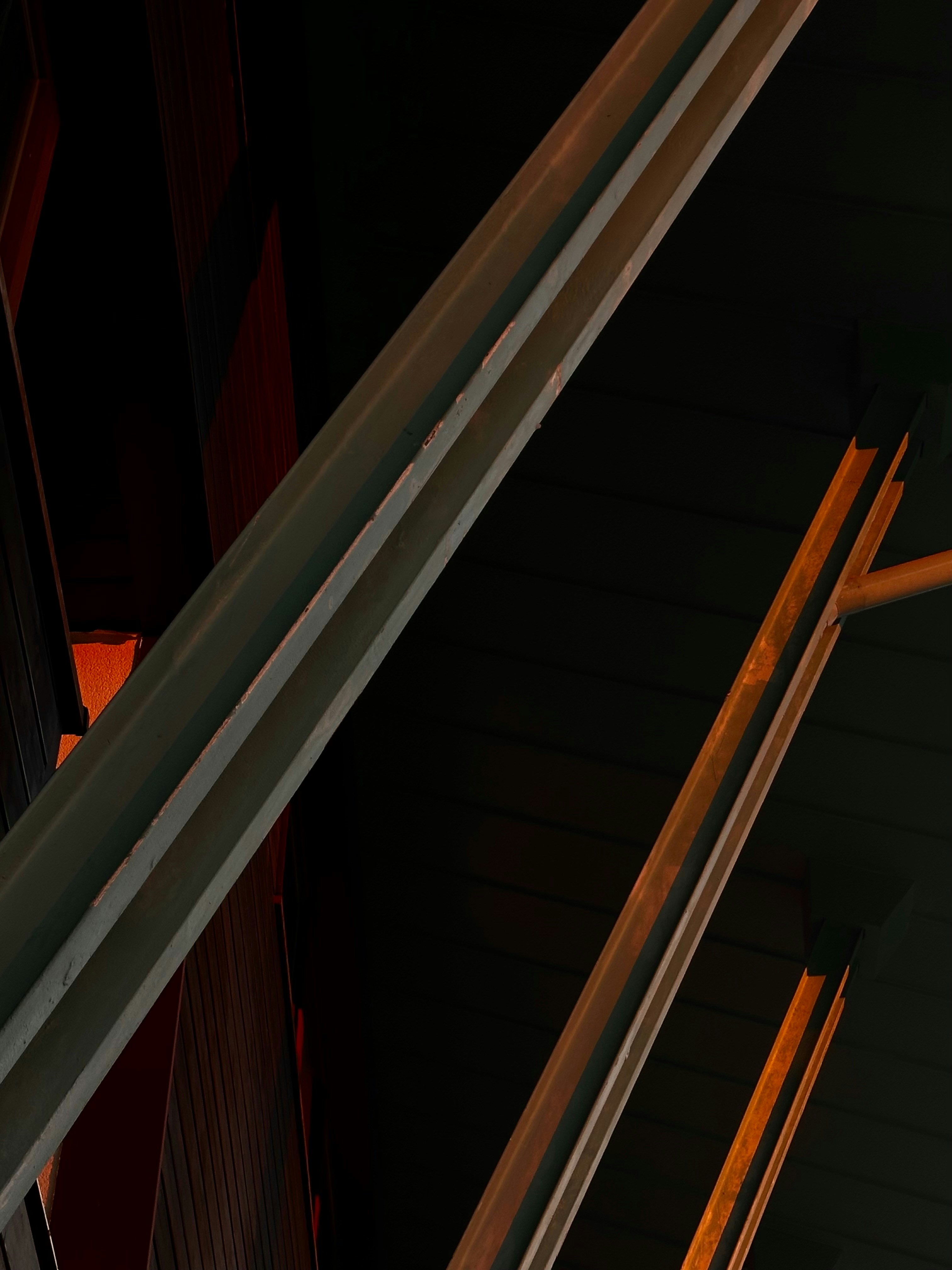 Steel beams and shadows create an abstract design.