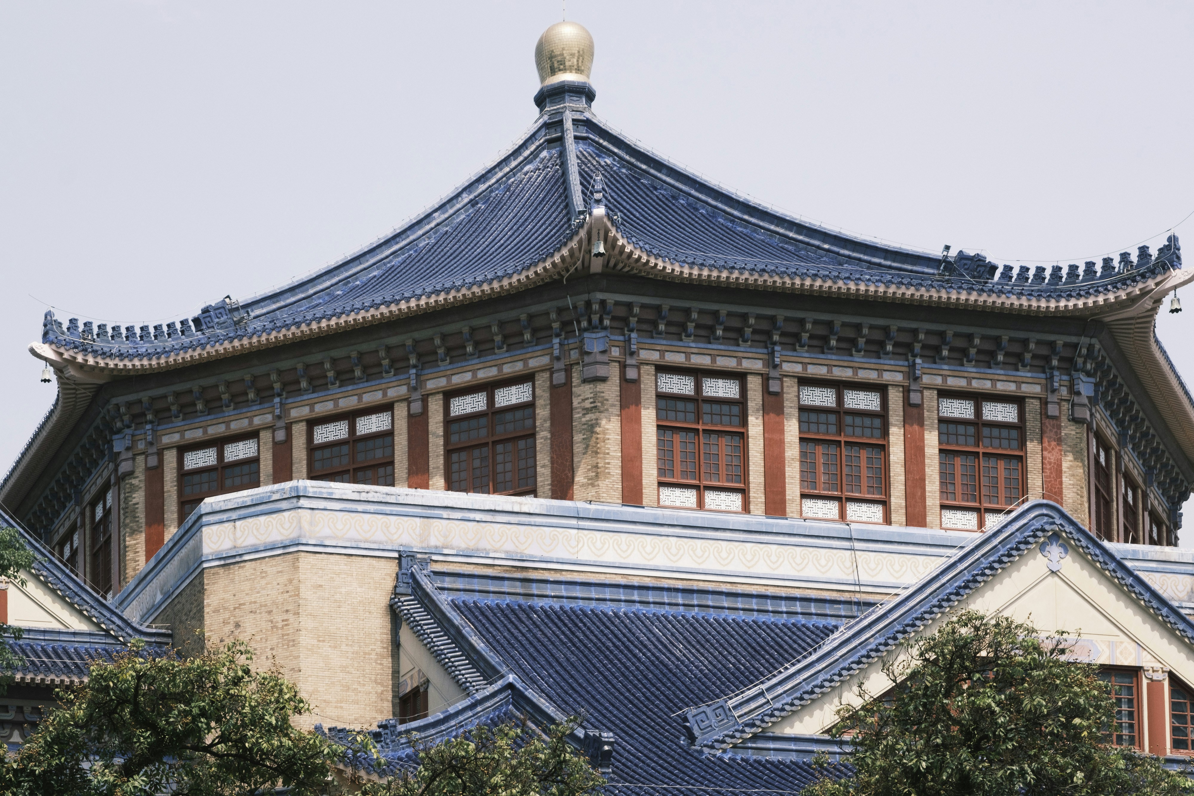 Architectural Elegance: The Blue-Tiled Rooftop