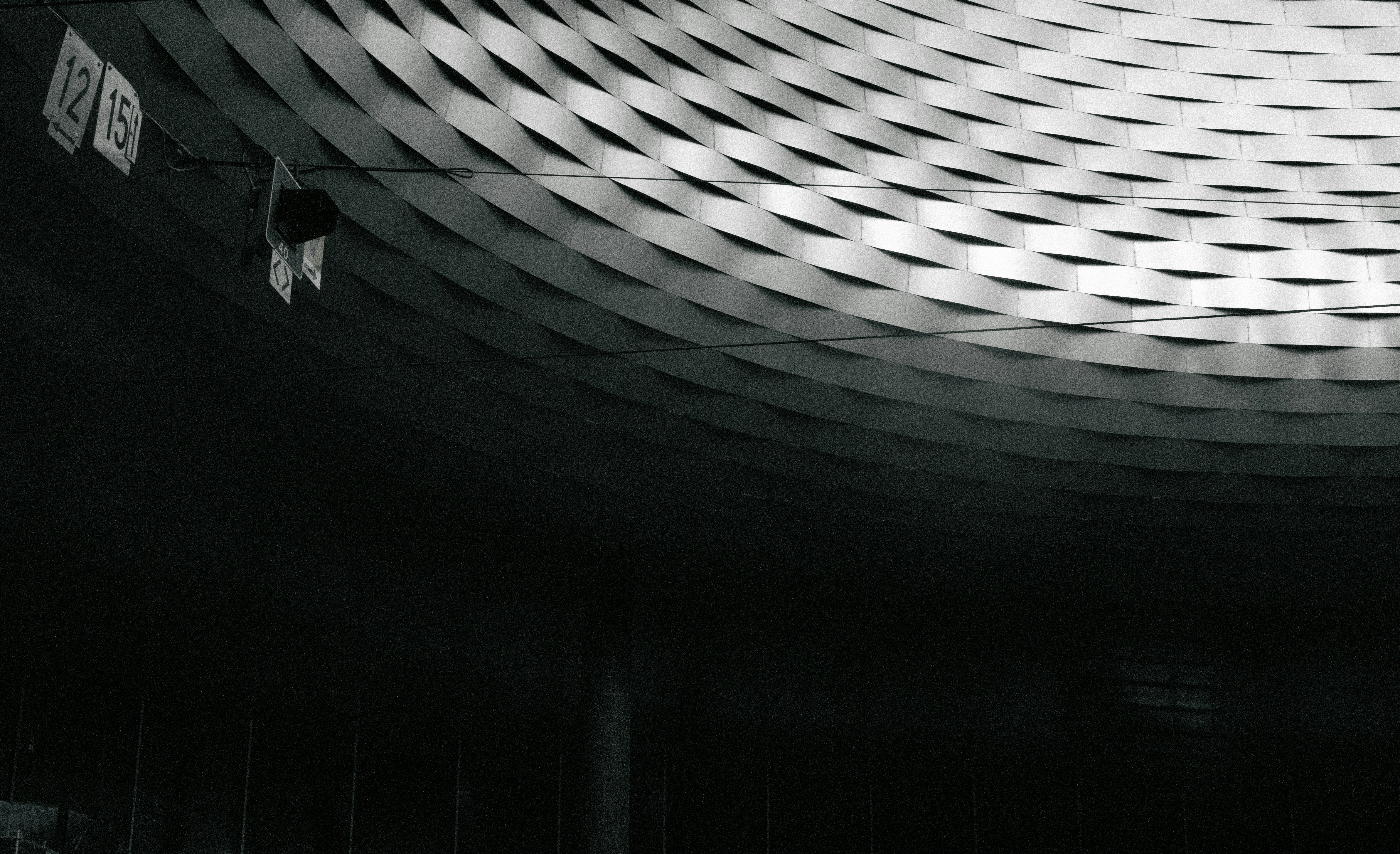 Architectural detail of a ceiling and its lighting.