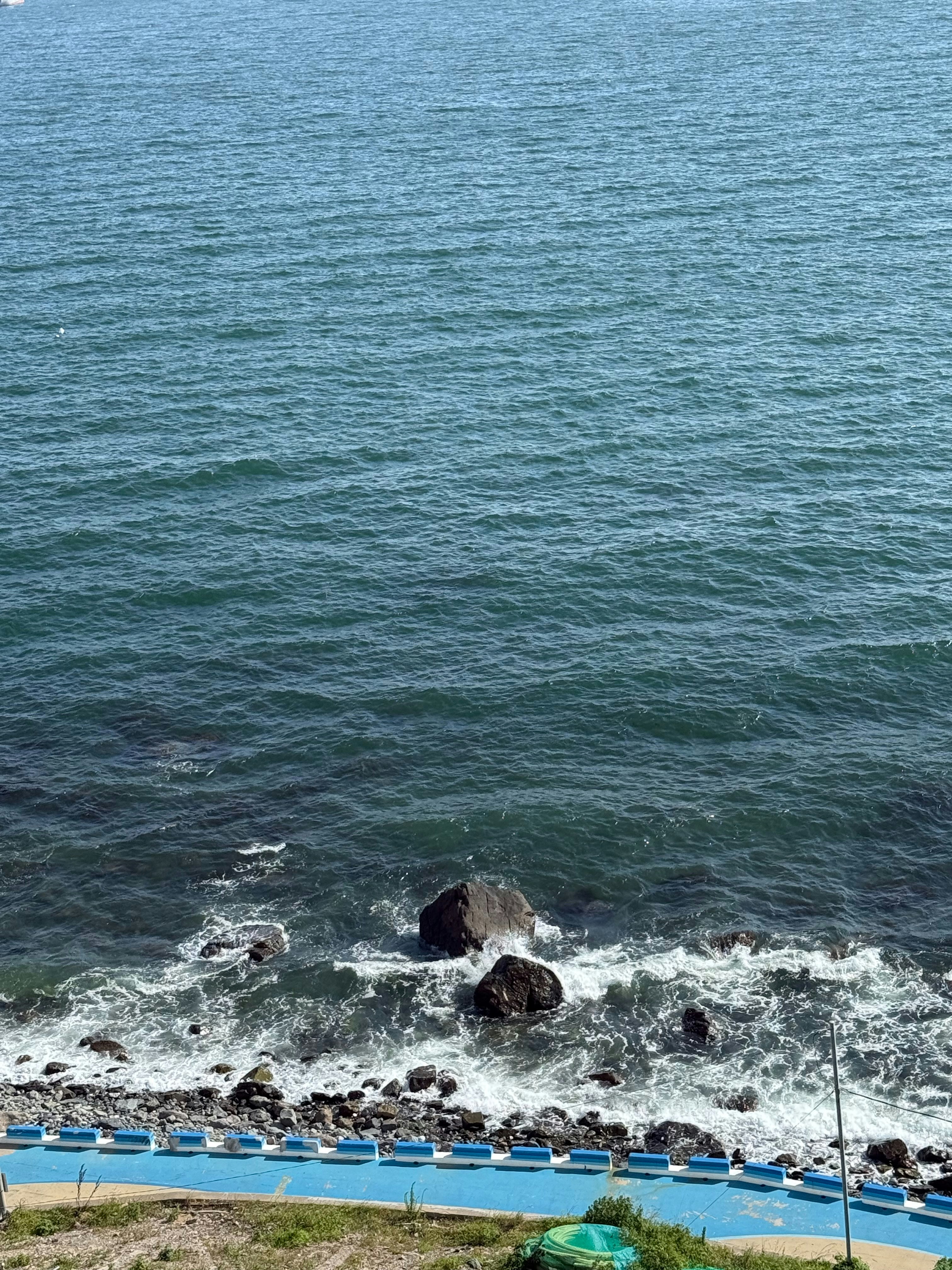 Serene Tides Embracing Rocky Shores