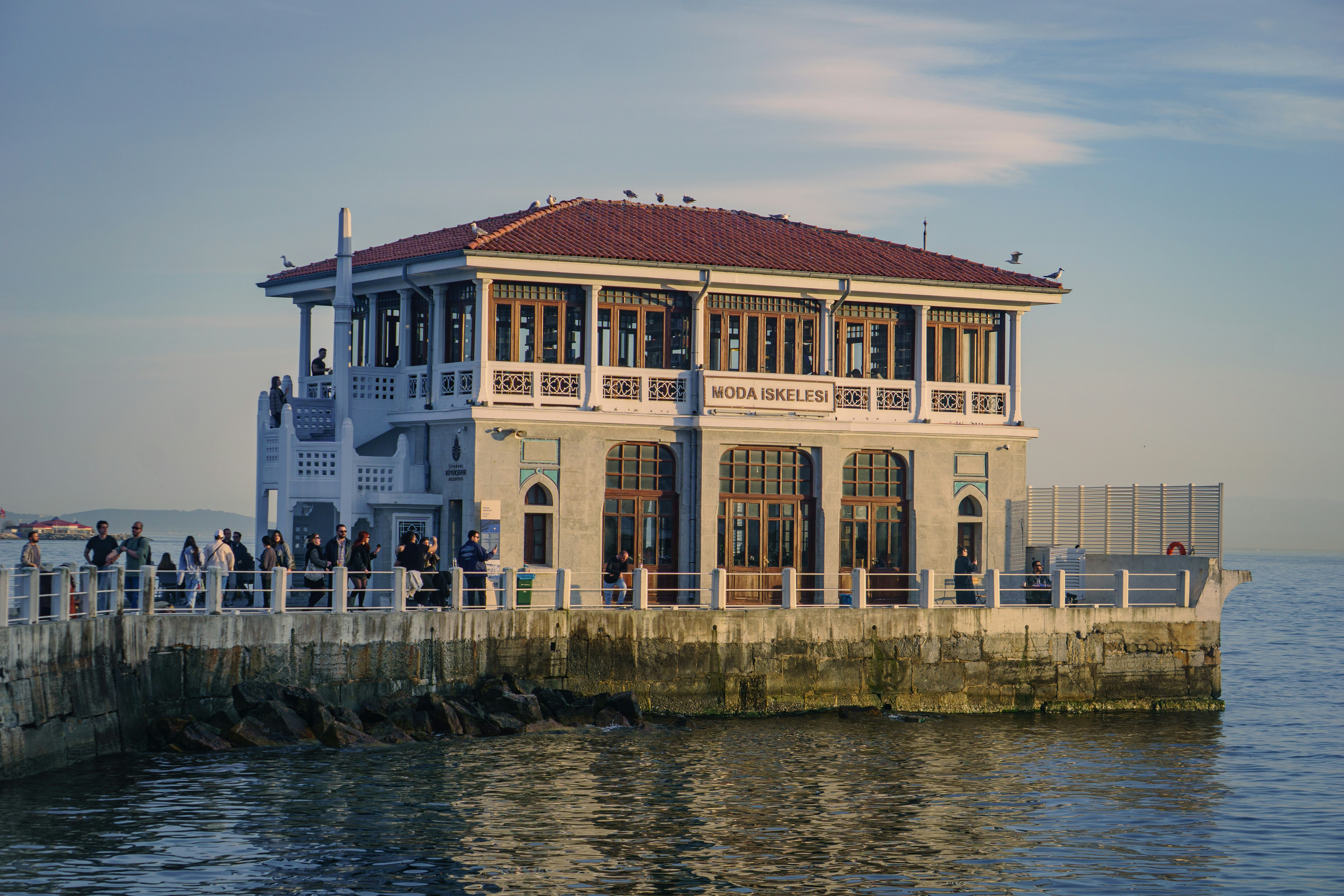 A grand waterside building stands out.