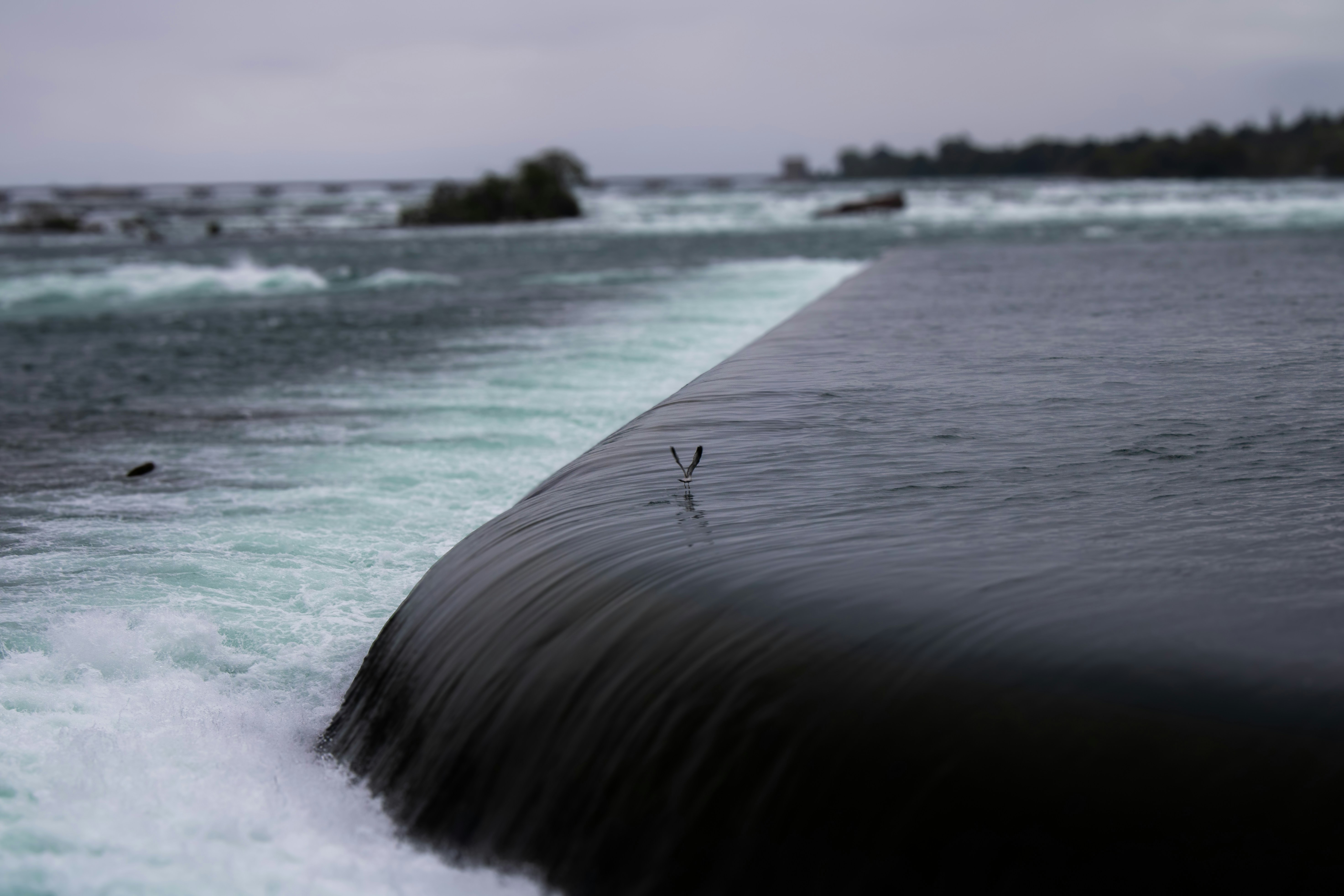 The Edge of Tranquility: Water's Gentle Descent