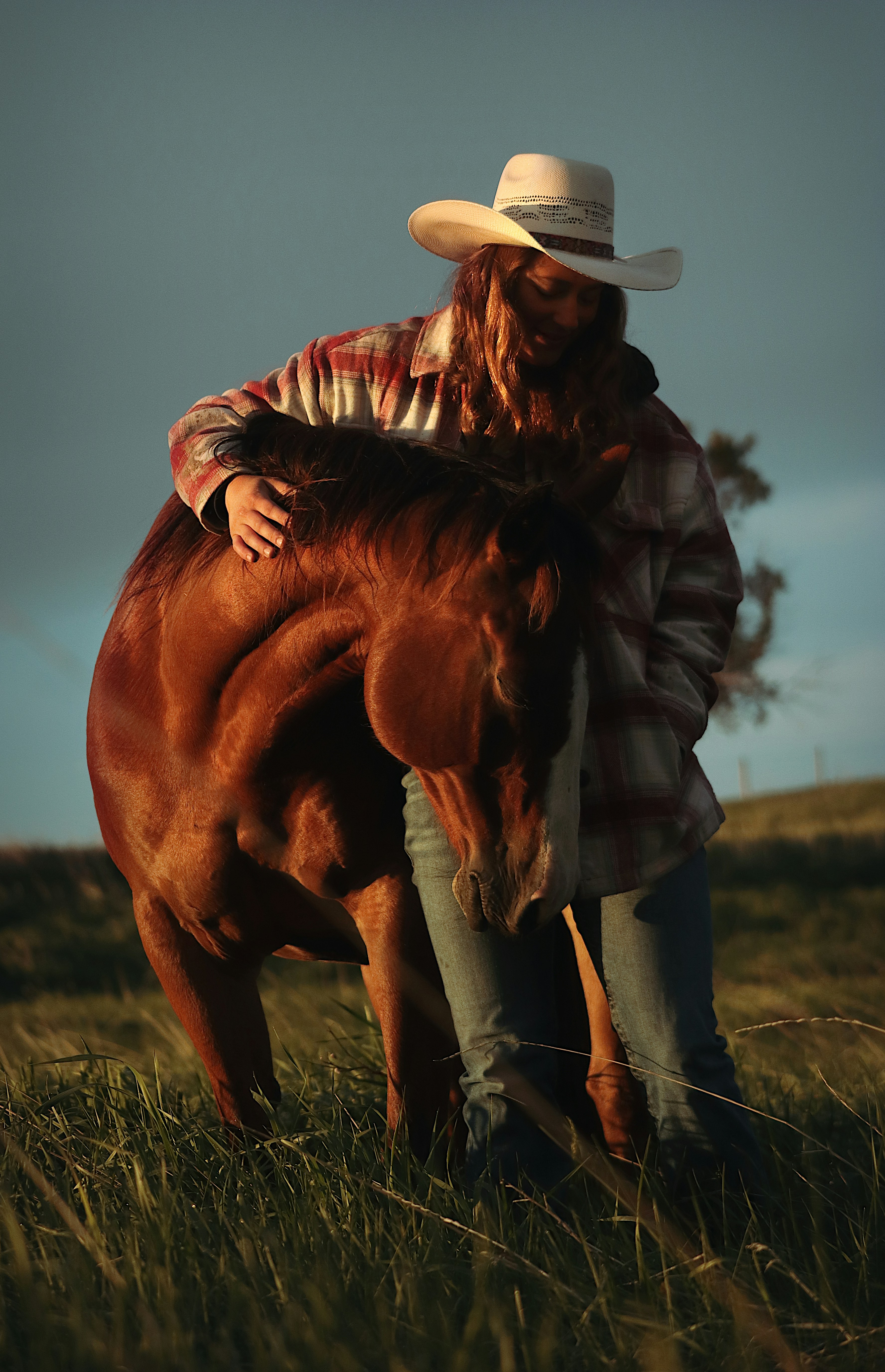 Chilling with the best boy in the world | Cowboy hugging his horse in a field.