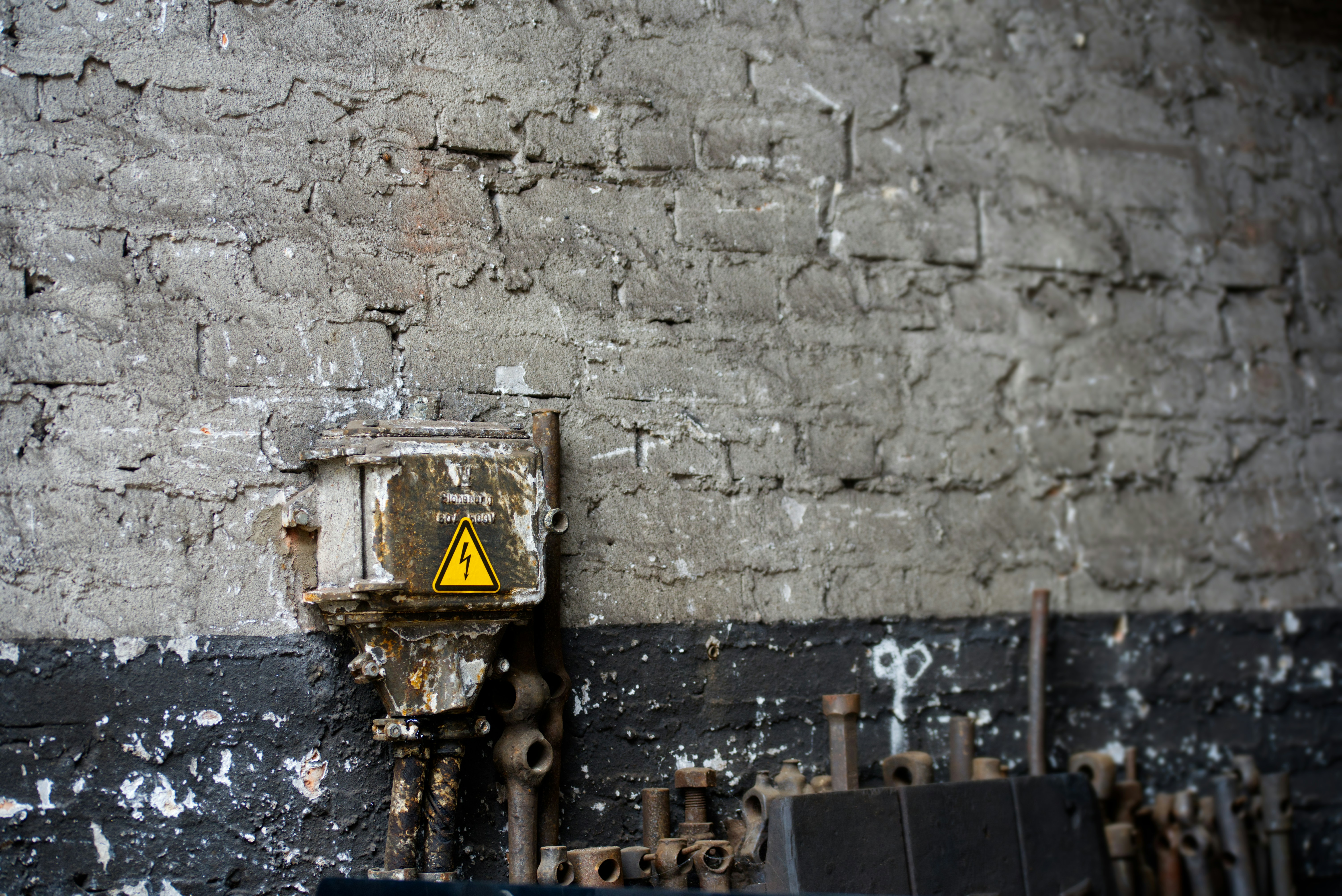 Old Wall Power Box | Old brick wall with electrical component attached.