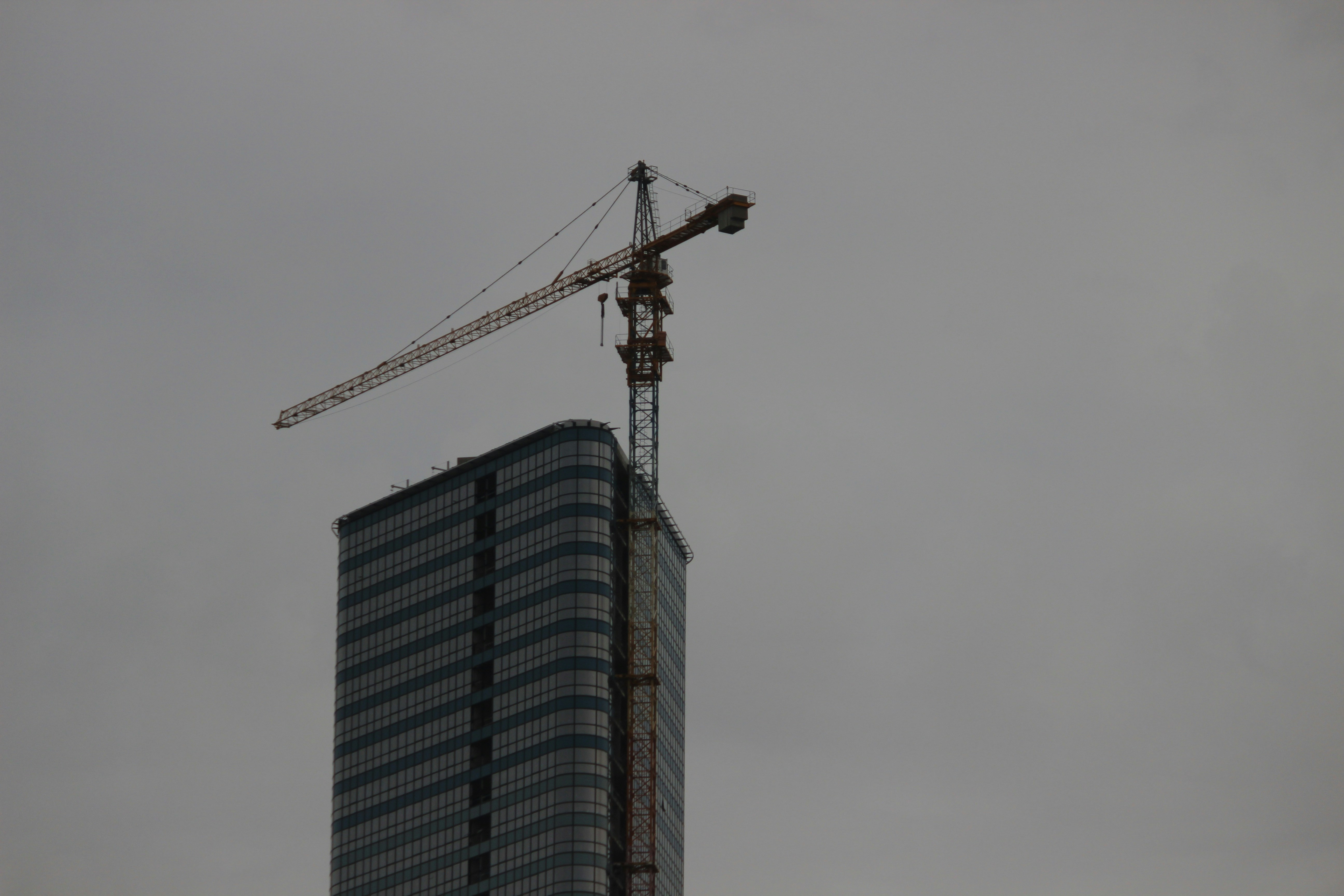 Urban Ascent: The Clash of Steel and Glass