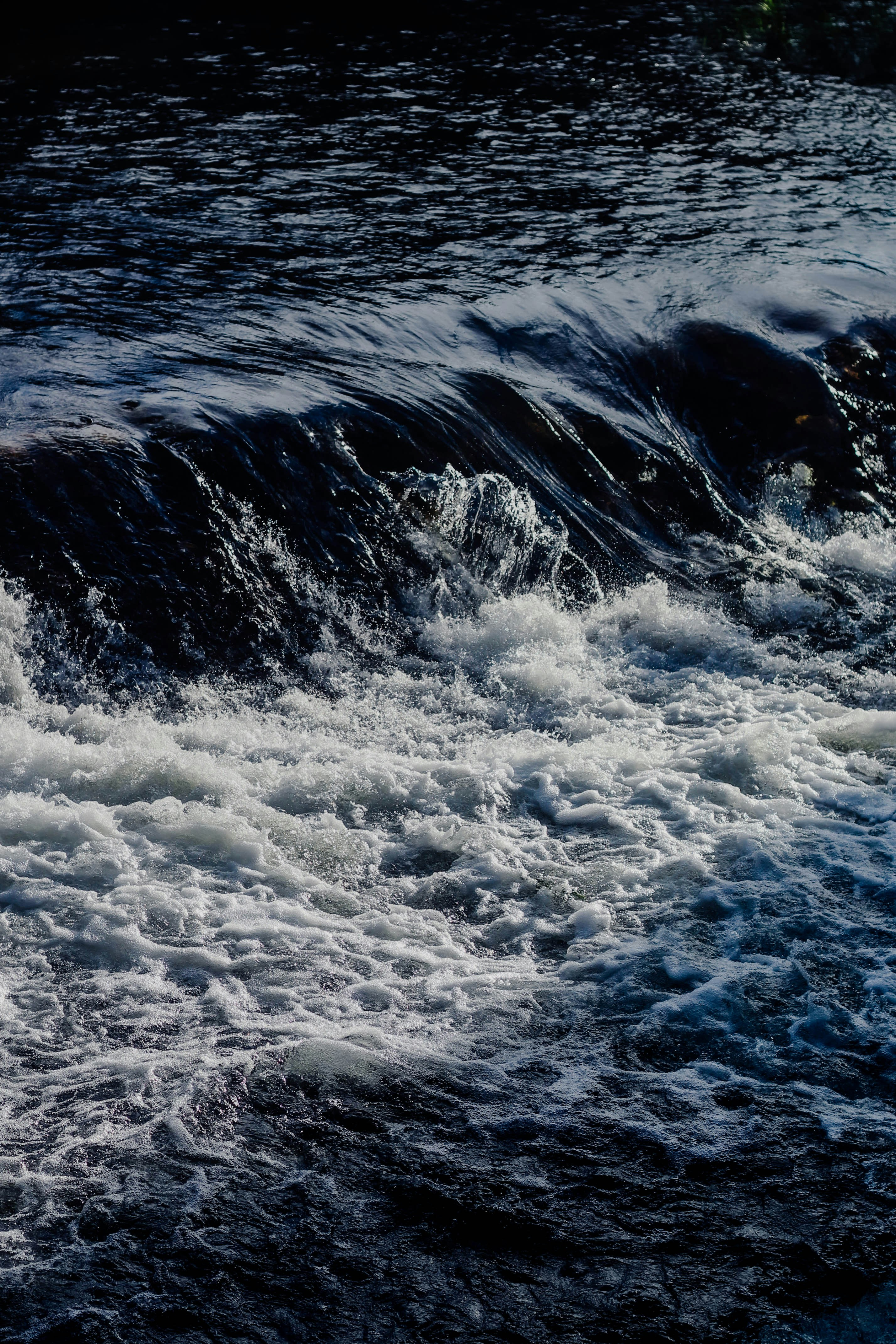 Waves of water create a foamy, choppy surface. photo – Free Water ...