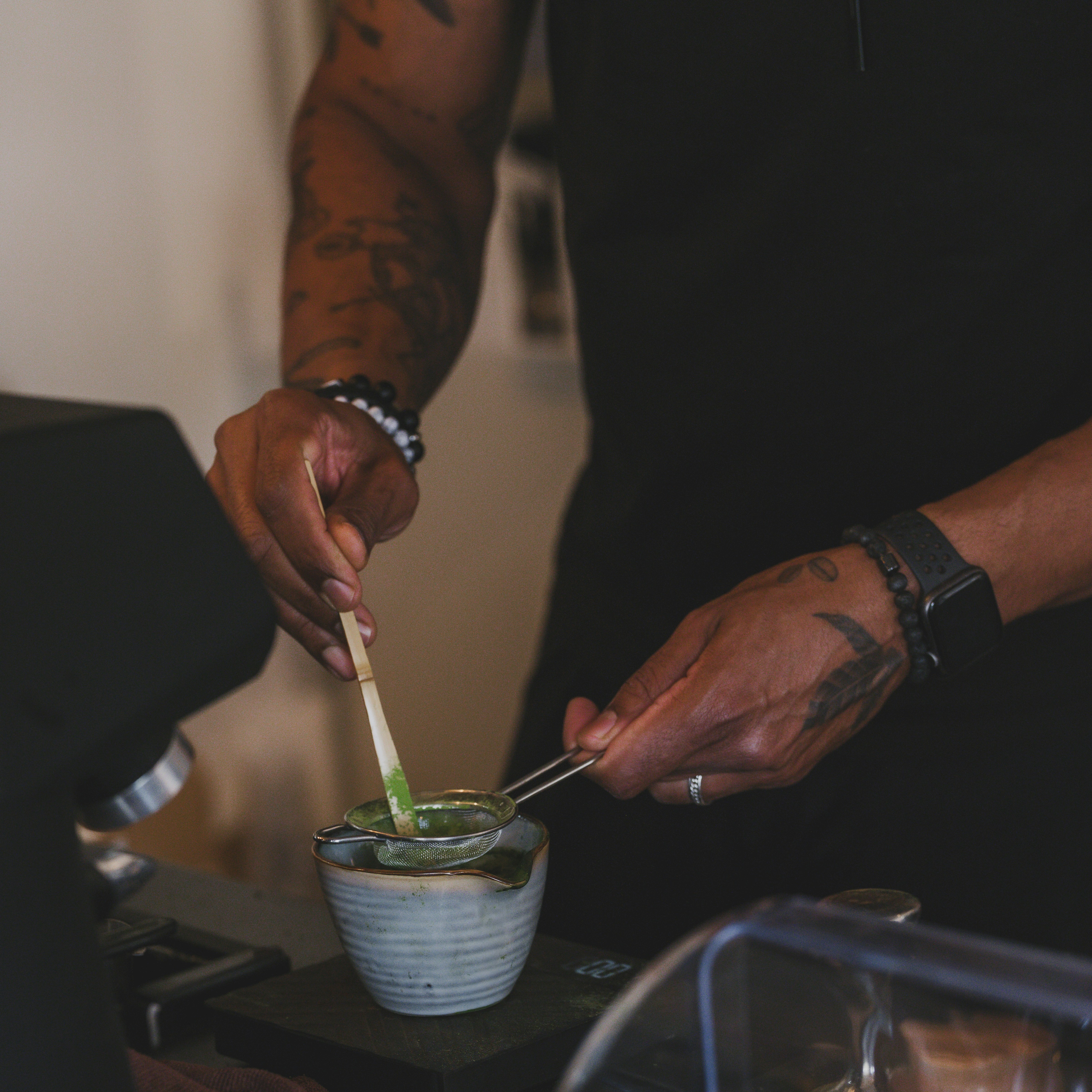 Green Glaze: Handcrafted Moment in a Small Ceramic Cup