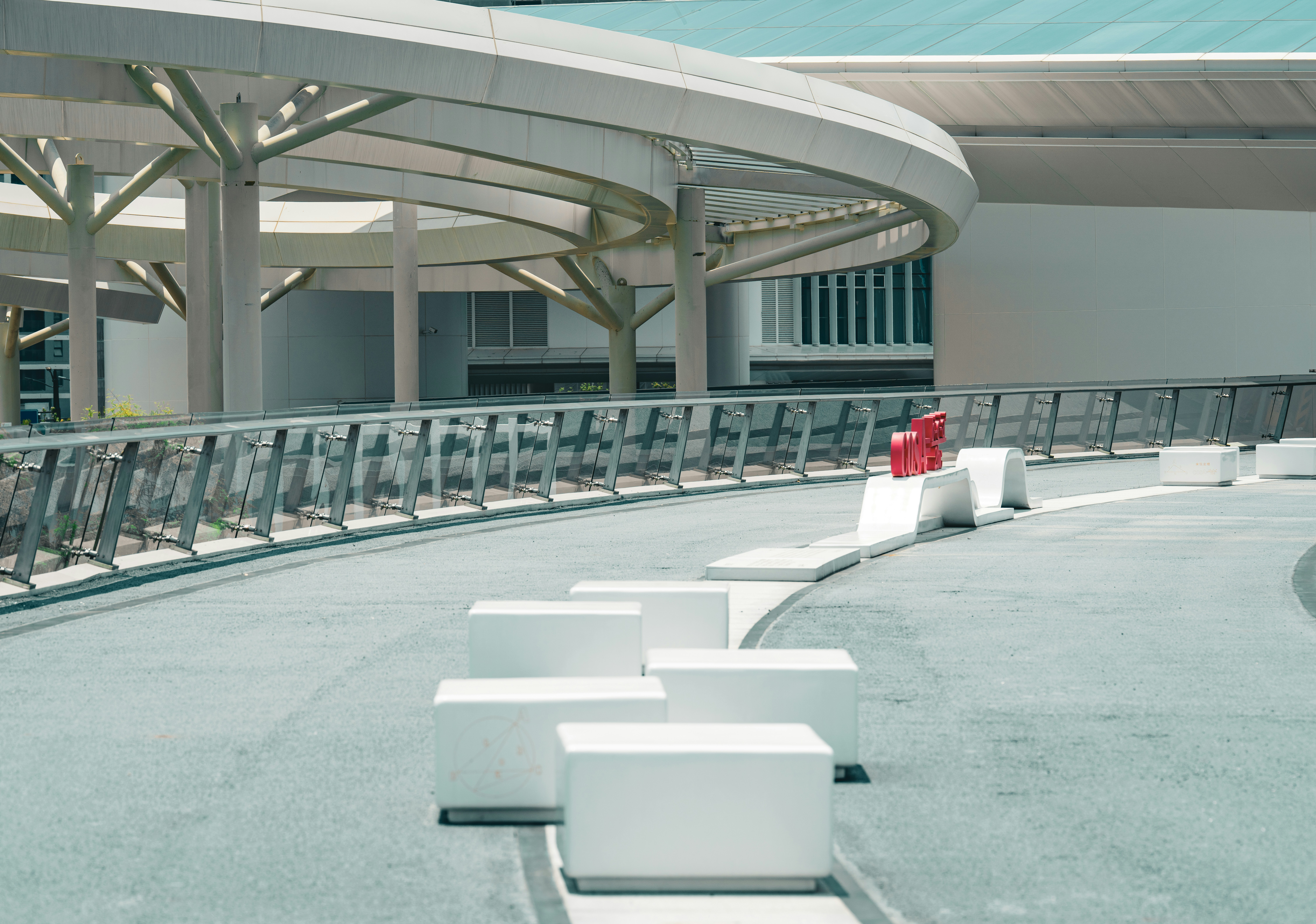 Curved Walkway and Recessed Seating at an Urban Courtyard