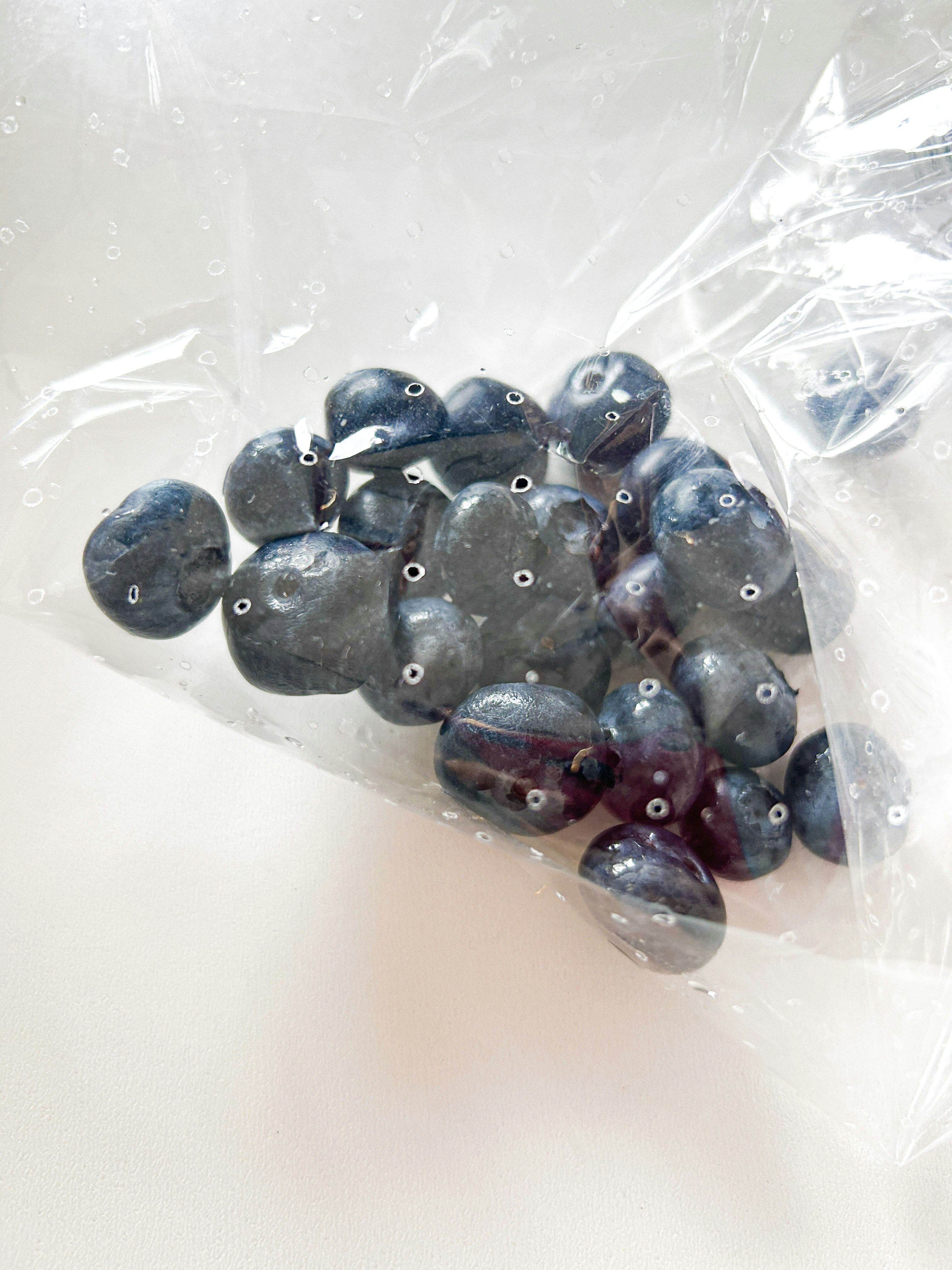 Blue Velvet in Plastic: A Quiet Close-Up of Fresh Berries