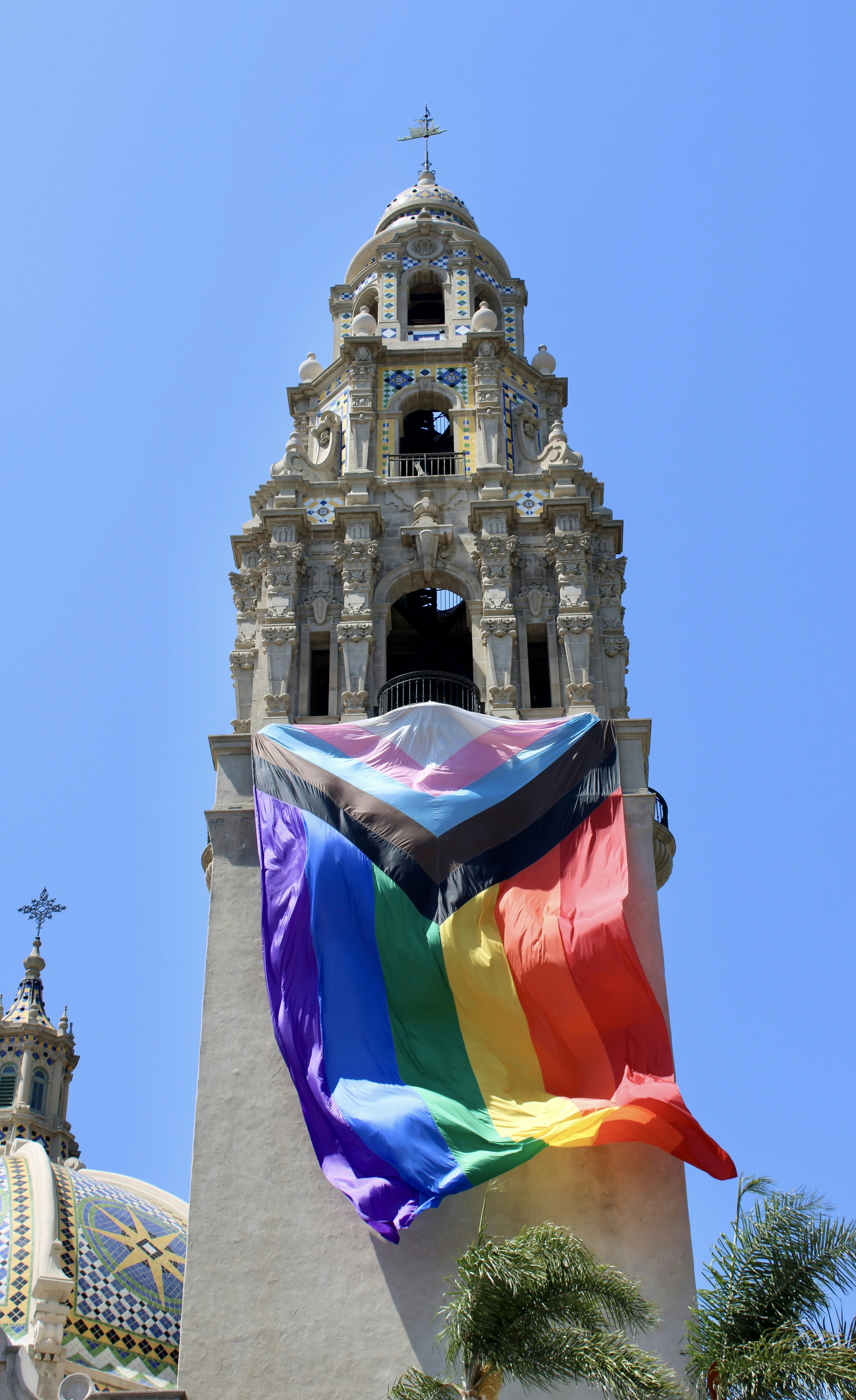 Flag Over the Bell Tower: A Colorful Banner Reigns