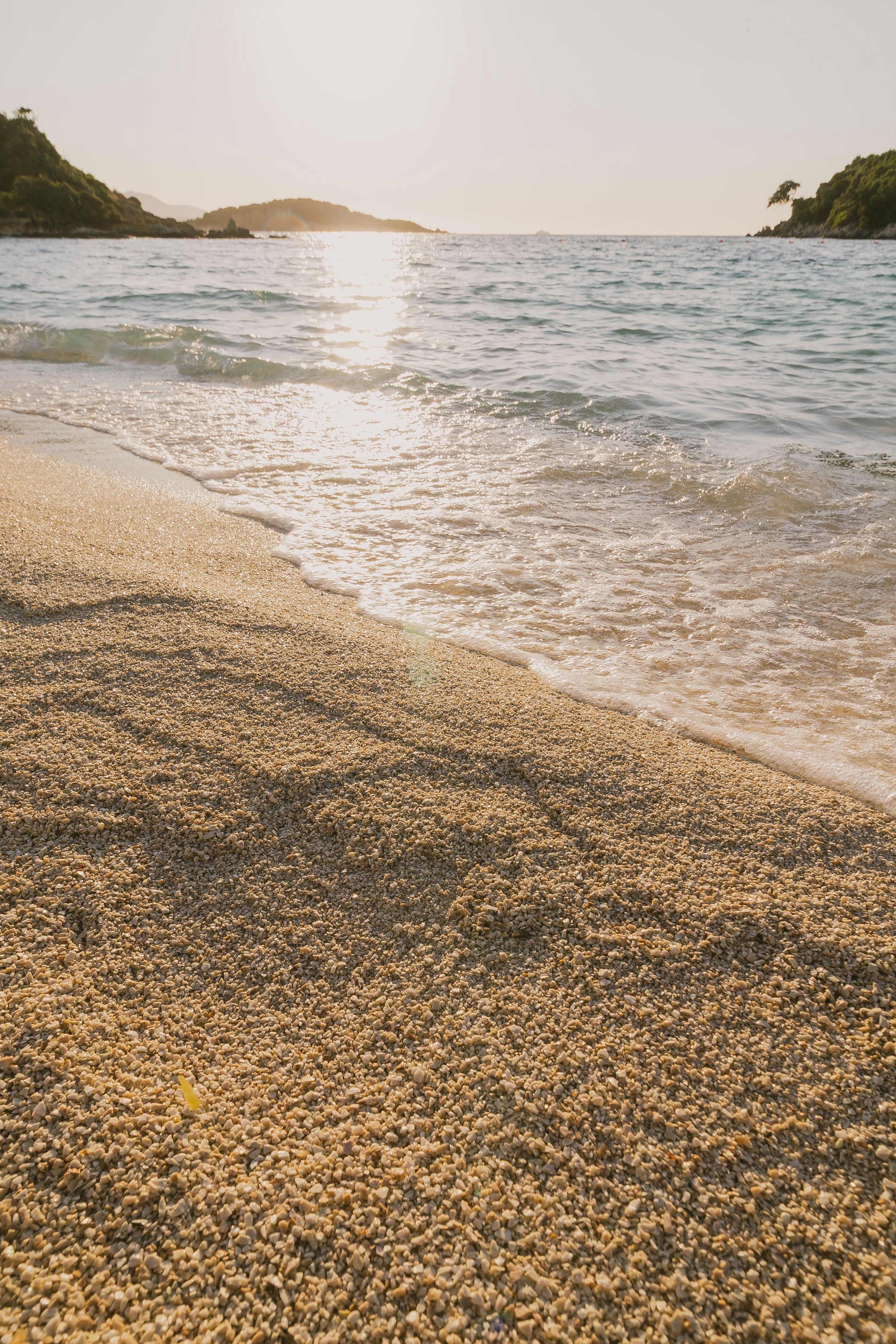 Golden Shores: A Tranquil Embrace of Land and Sea