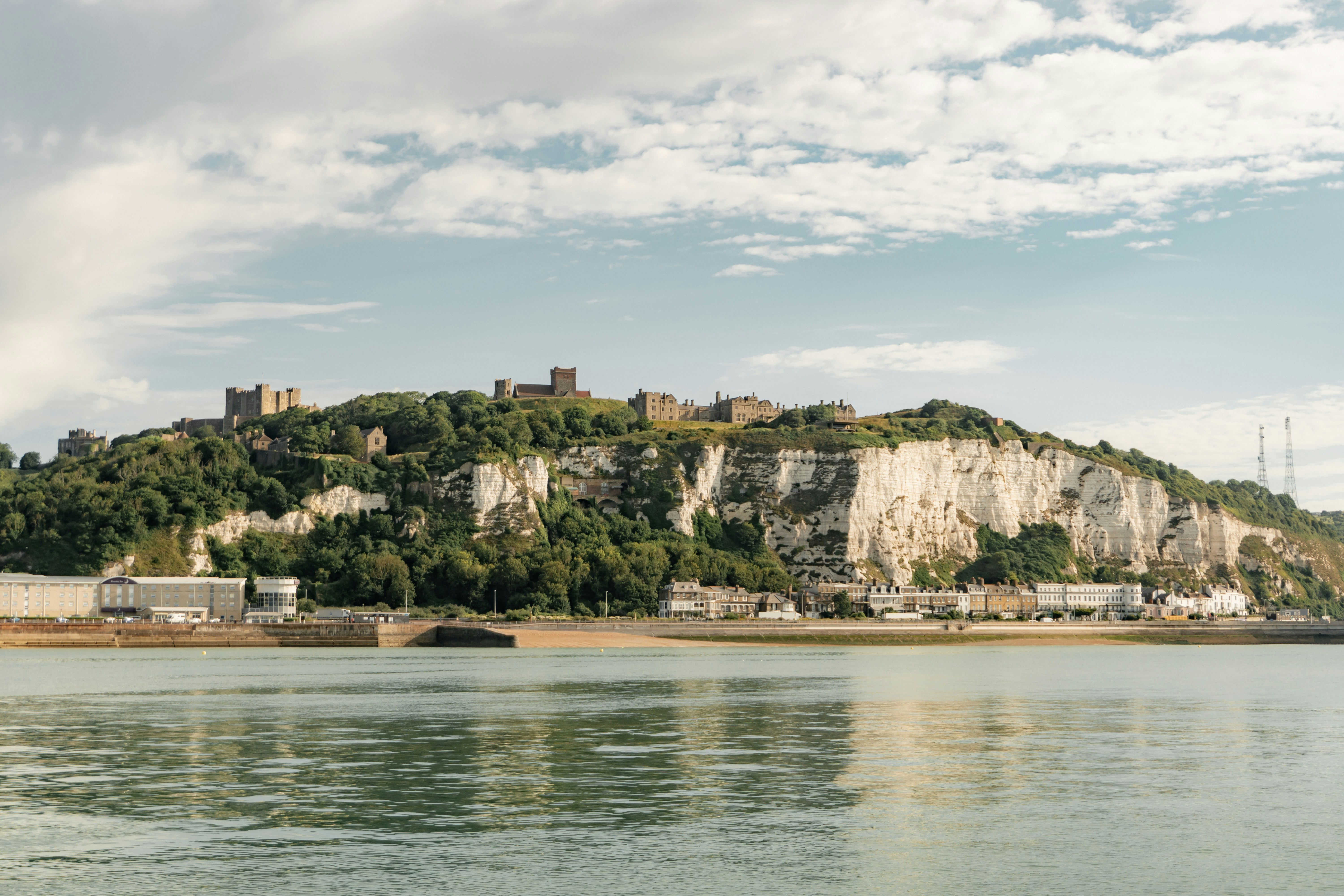 Castle sits atop the white cliffs of dover.