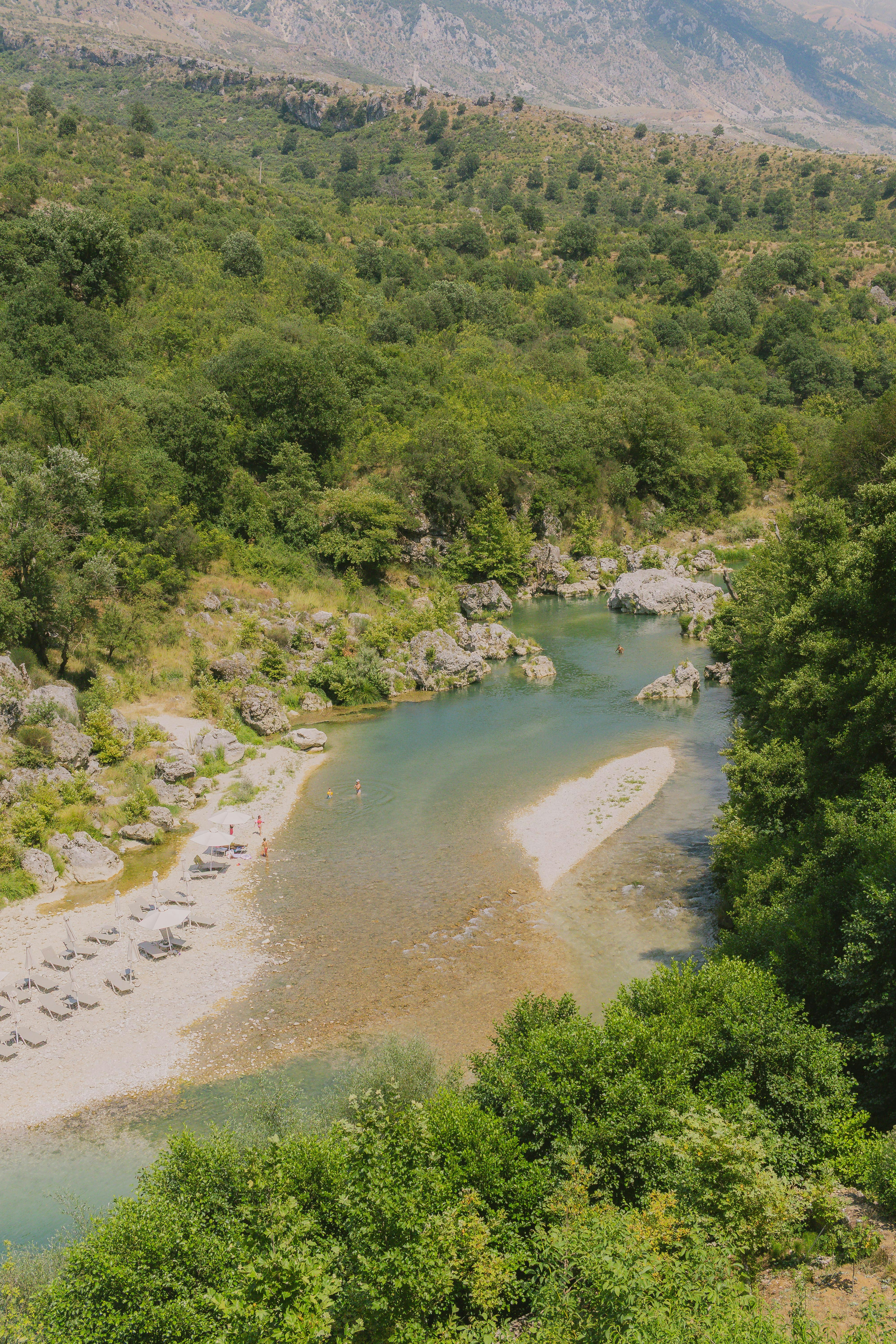 A river winds through a lush, green landscape.