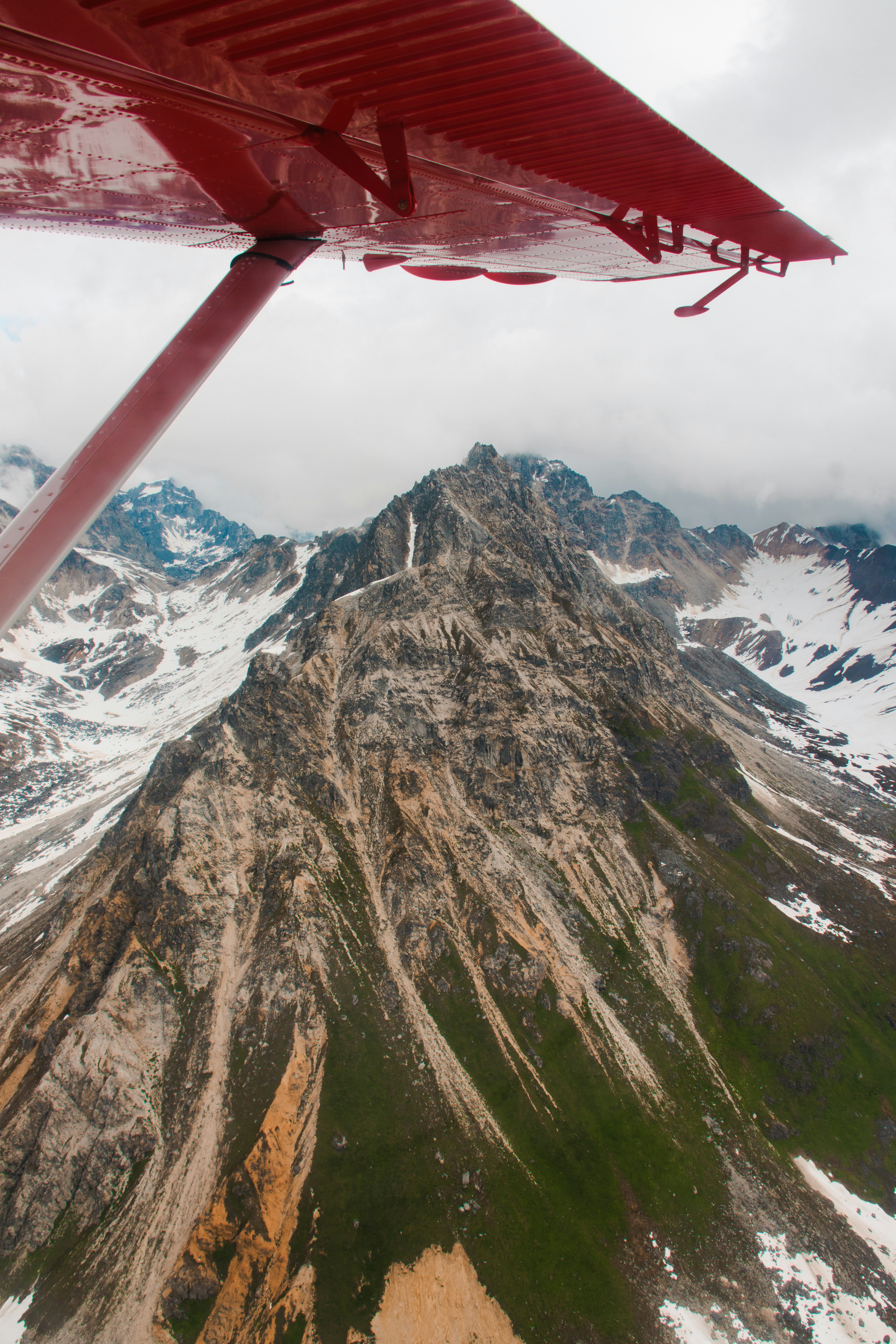 Majestic Peaks Beneath the Wing