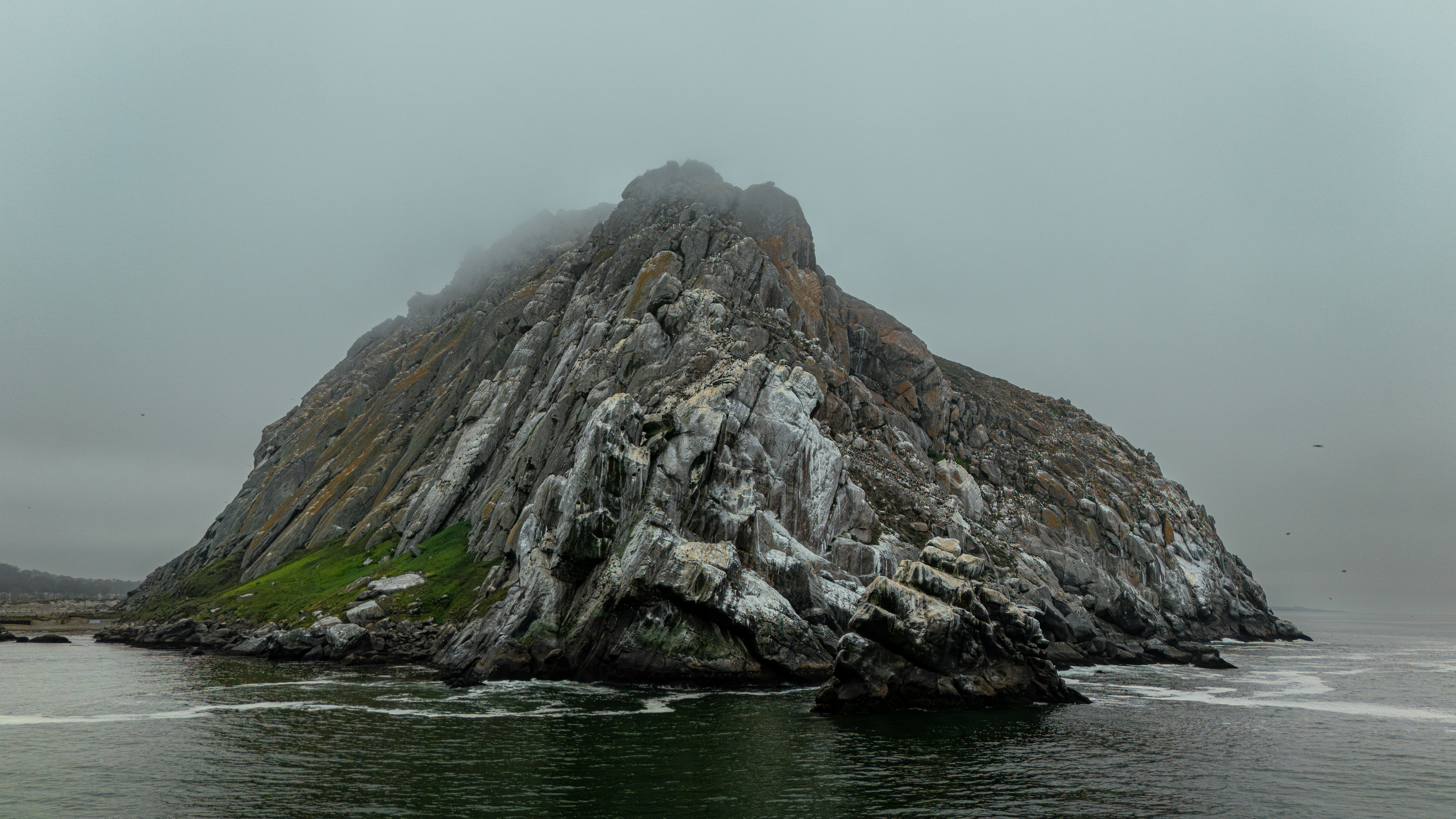 Mist-Kissed Granite Isle Carved by Quiet Seas