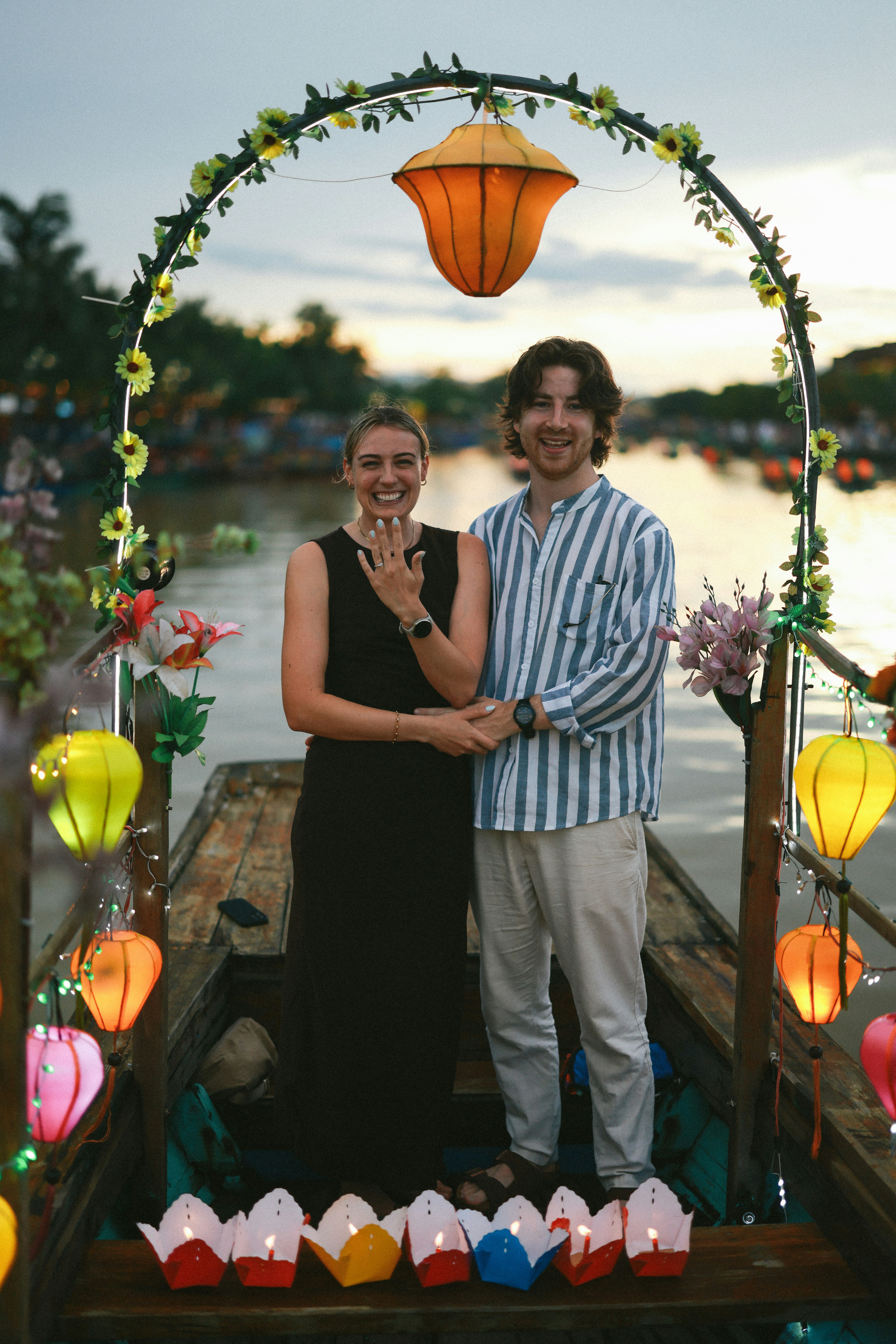 A couple celebrates their engagement on a boat. photo – Free Flower ...