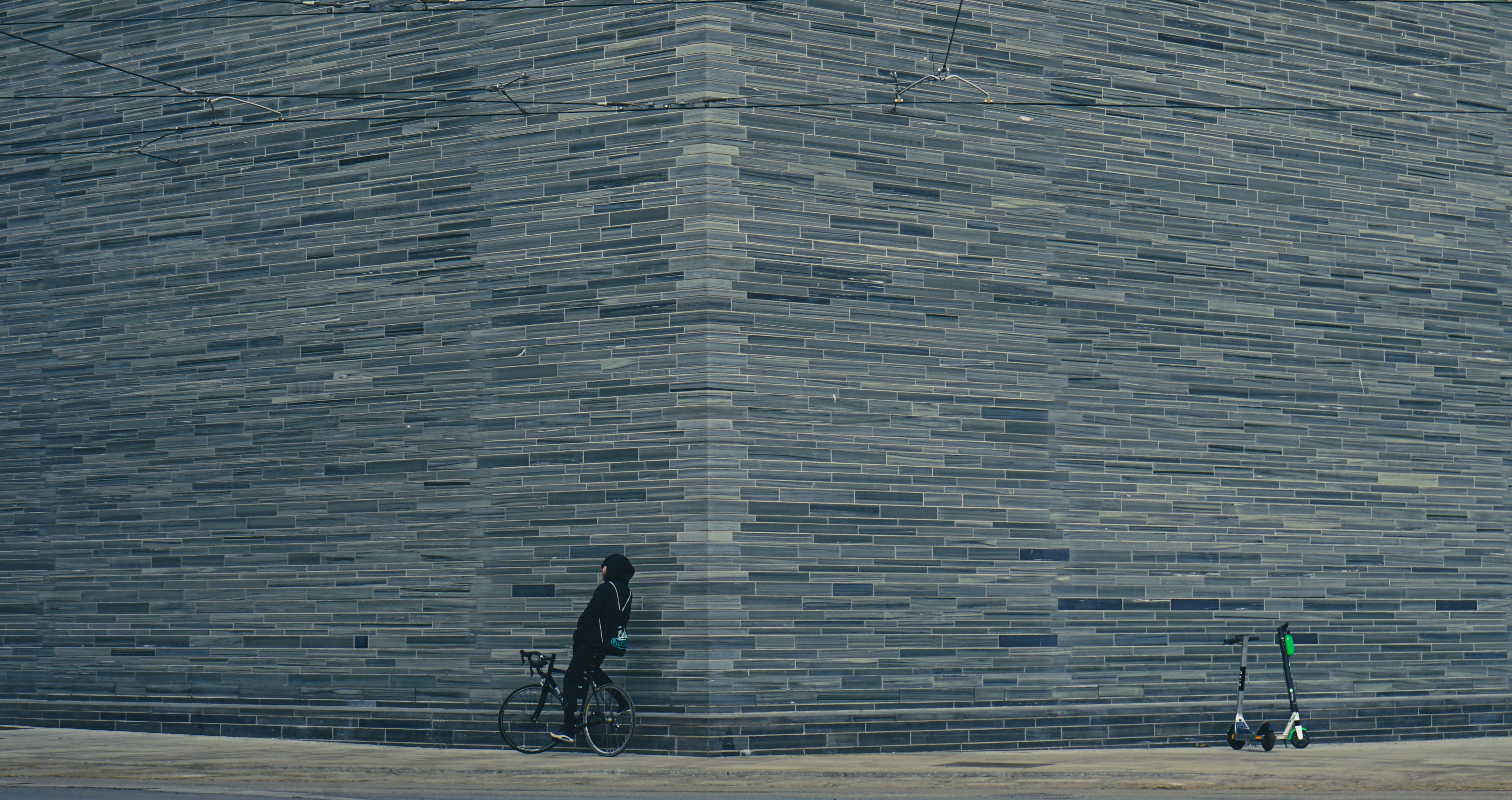 Urban Solitude: The Intersection of Motion and Stillness