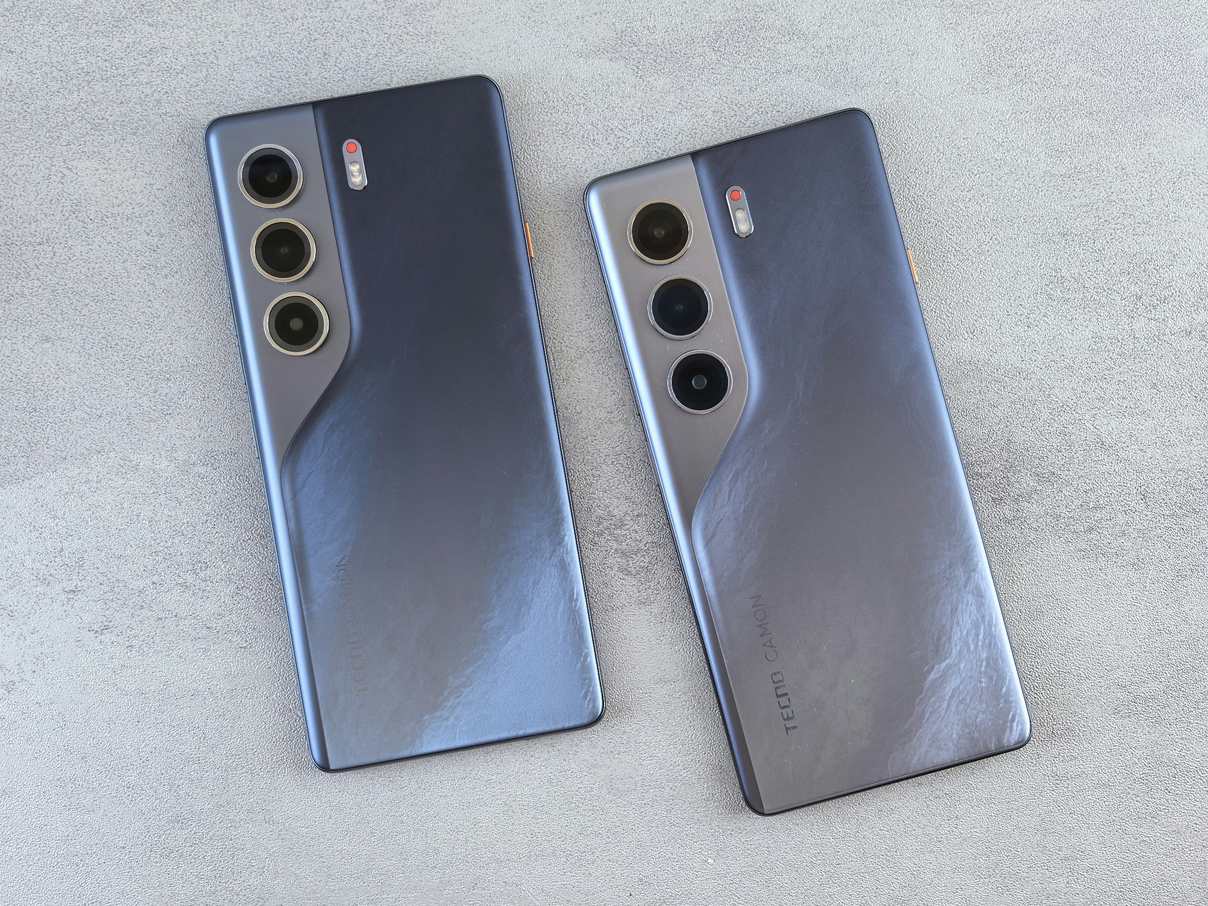 Close-up of two Huawei Mate 70 Pro smartphones showcasing their sleek backs and camera arrangements. The design emphasizes modern aesthetics and advanced technology.