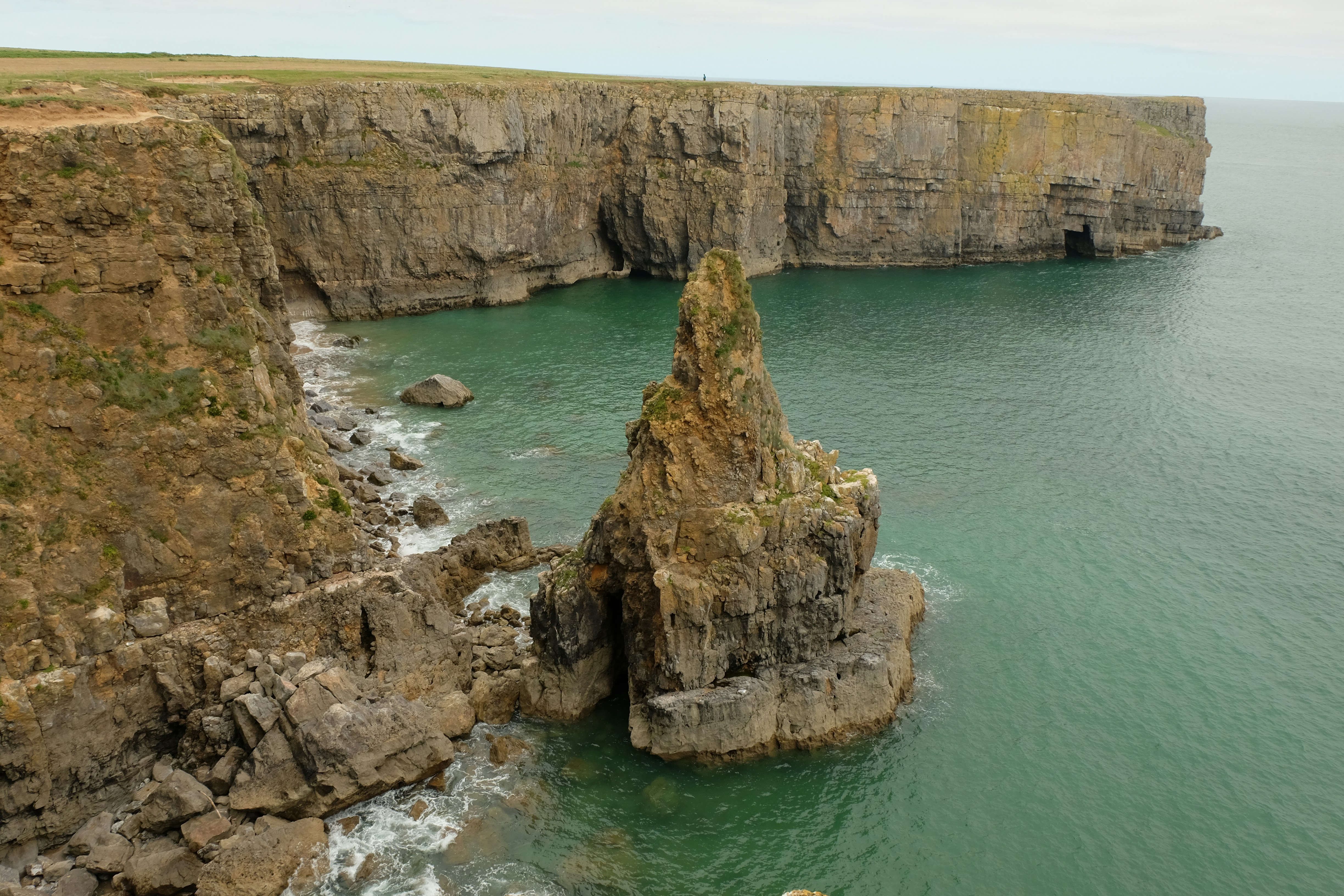 The Sentinel of the Sea: A Coastal Monolith