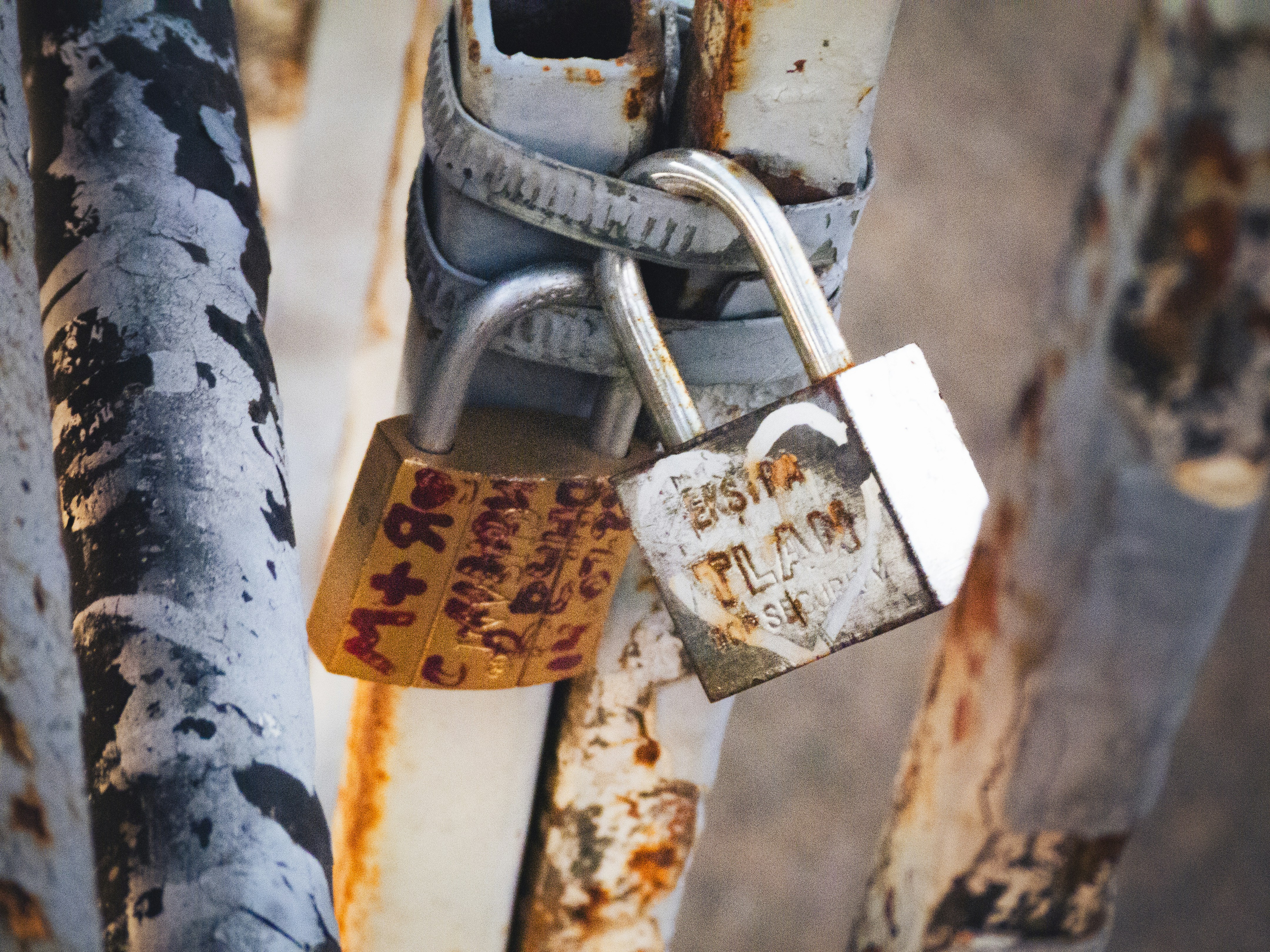 love locks on a bridge in Dnipro. | Love locks symbolize eternal commitment and affection.