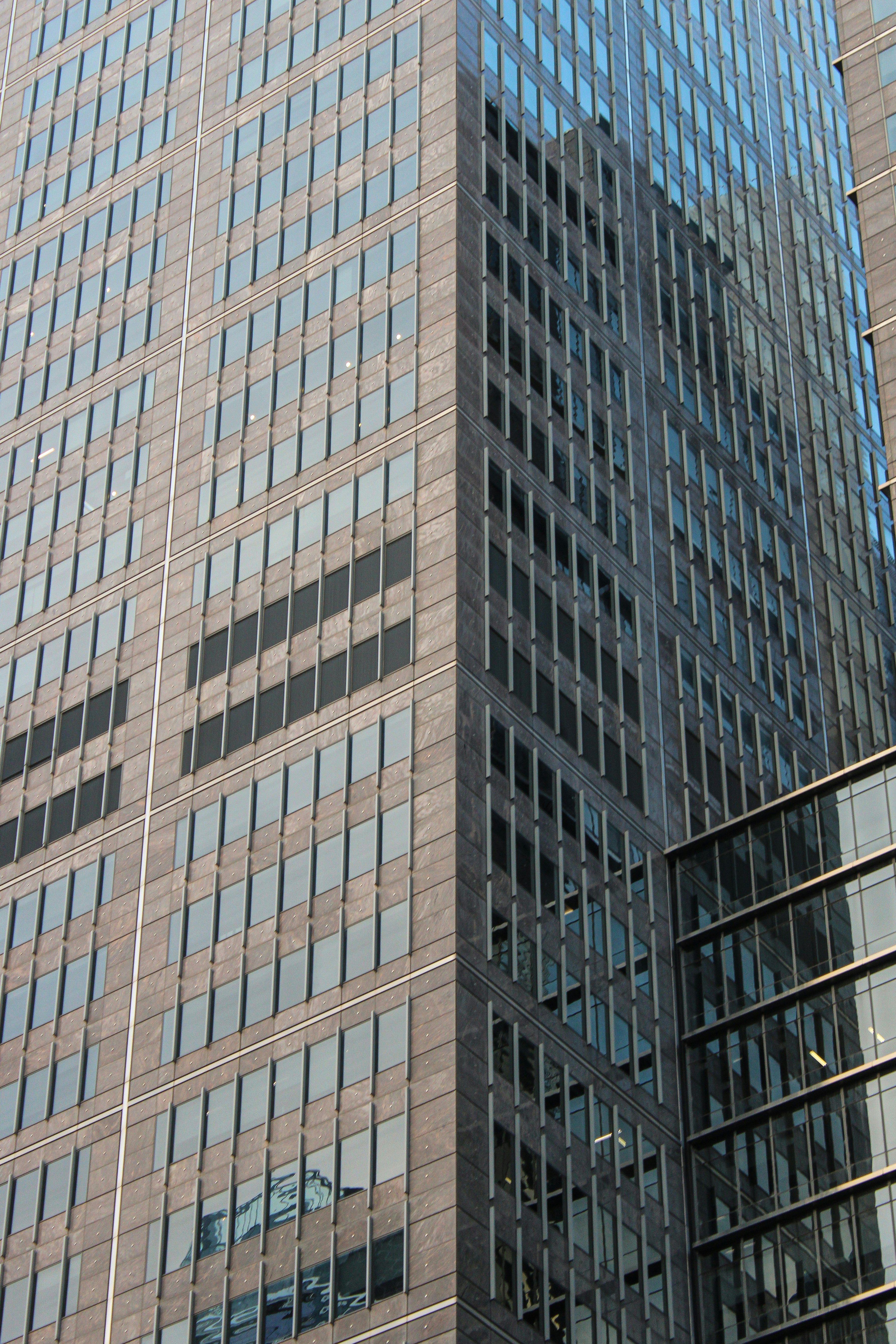 A tall office building with many windows.