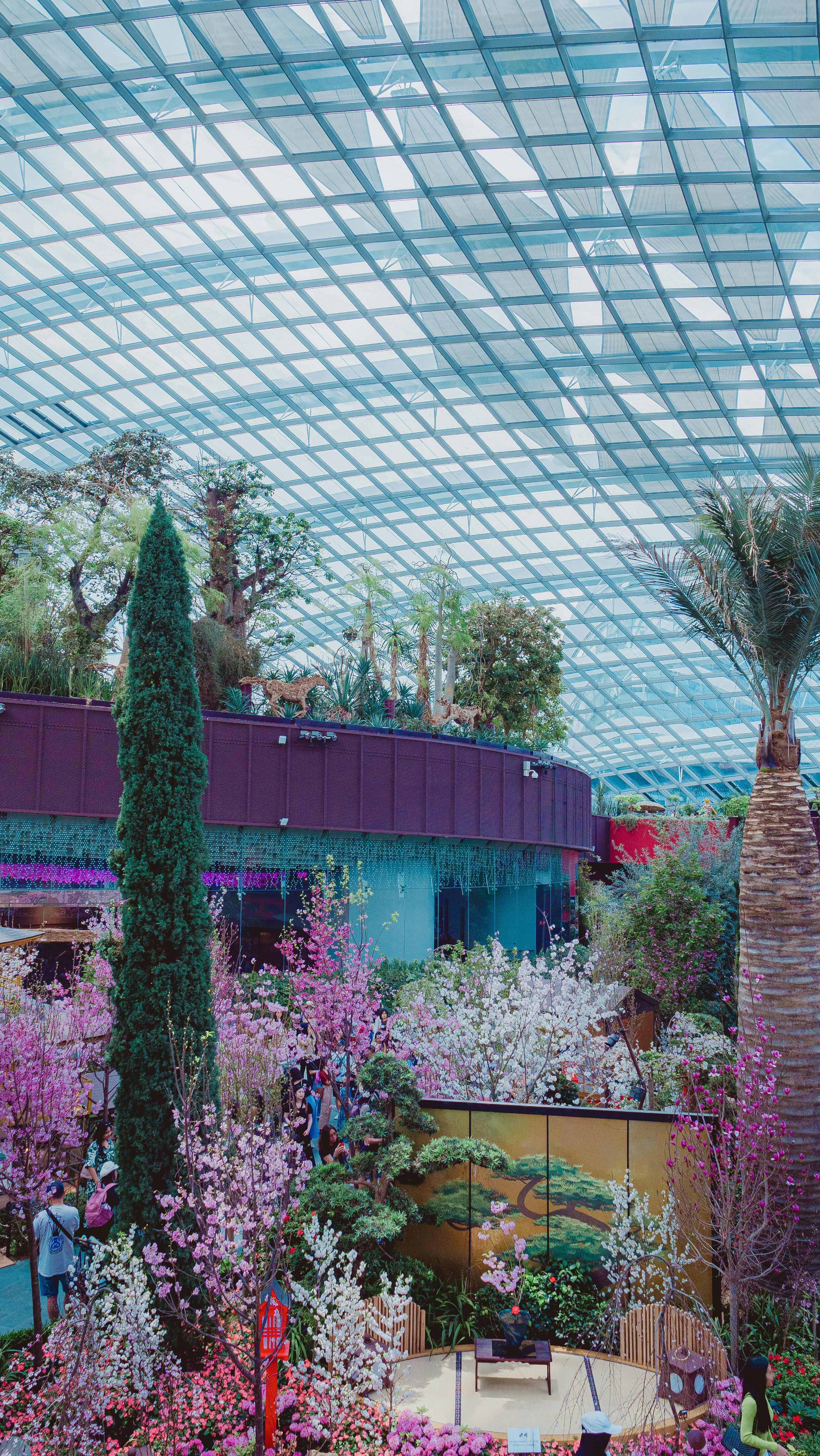 Diamond Ceiling Garden: Blooming Atrium Under a Geometric Glass Roof