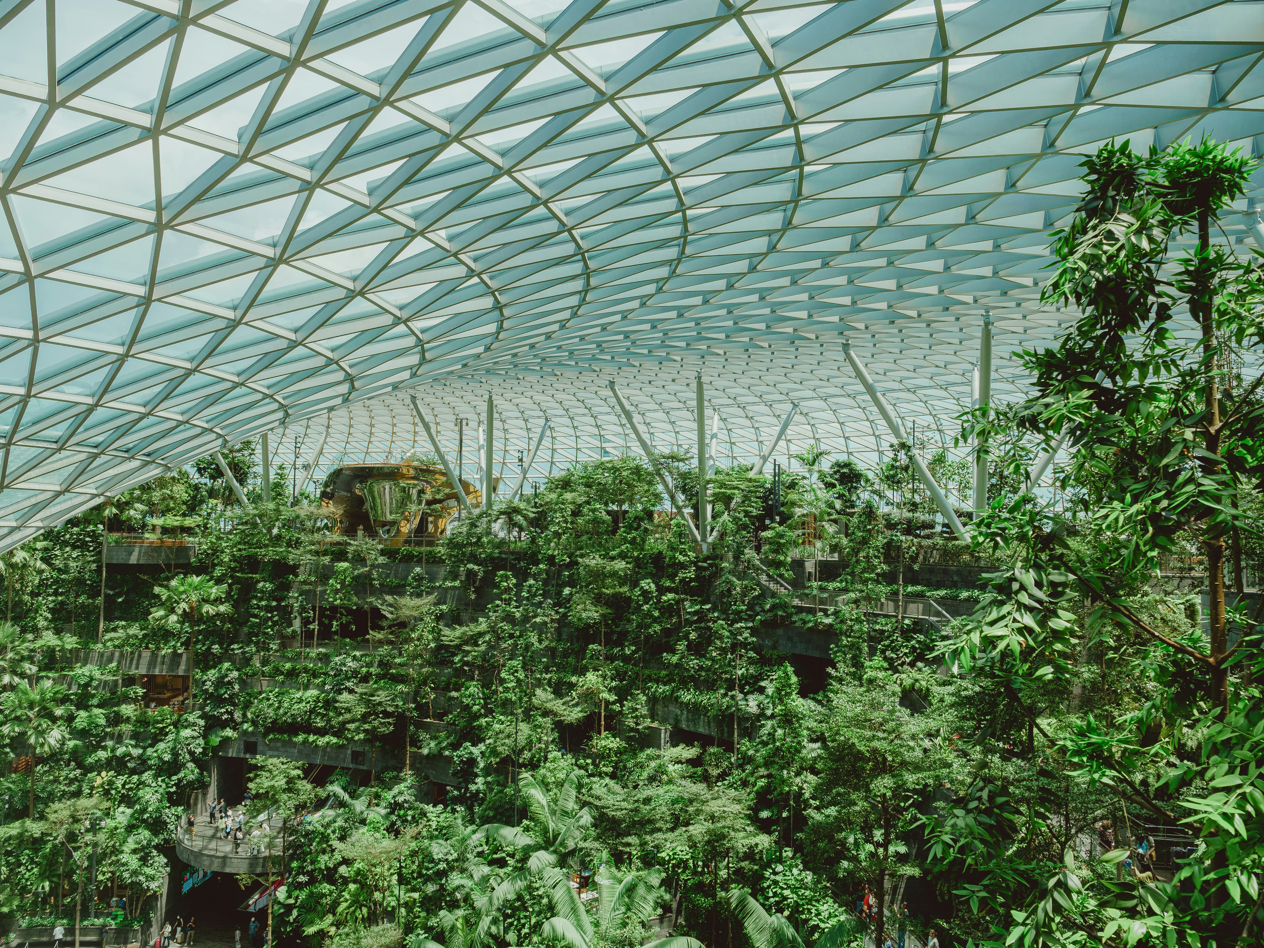 Emerald Tiers Beneath a Diamond Glass Conservatory