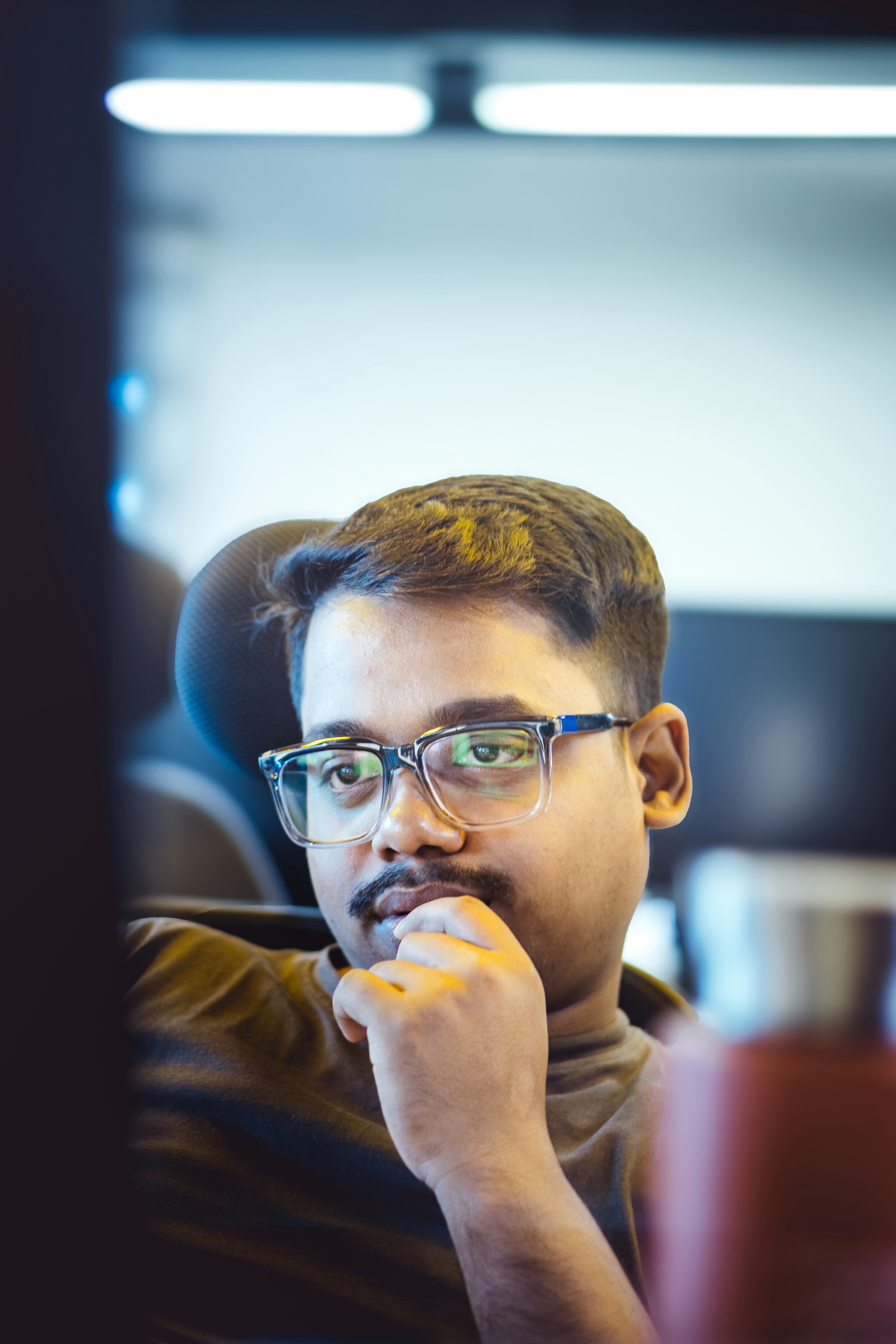 A man with glasses appears to be thinking. photo – Free Food Image on Unsplash