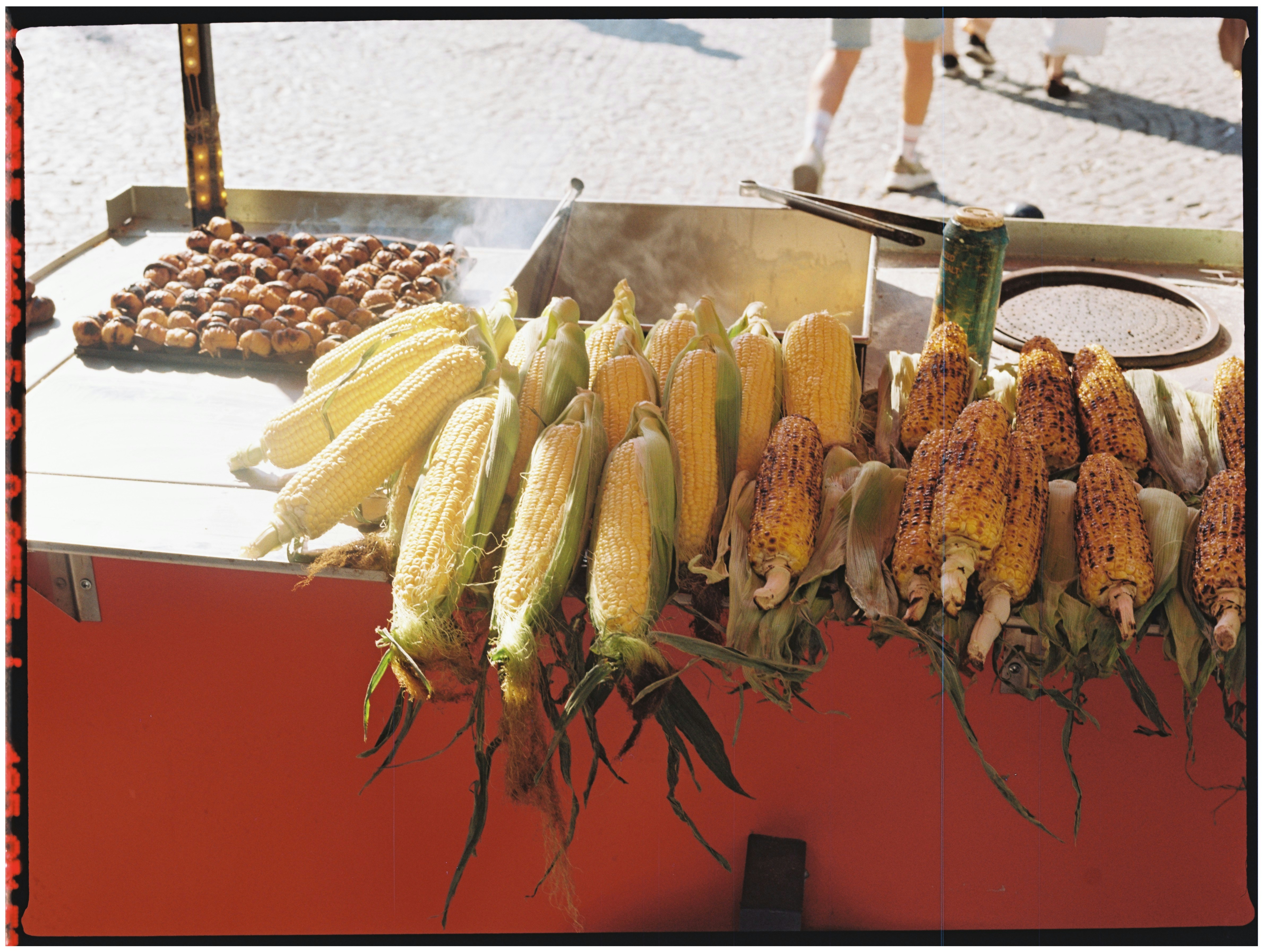 Corn on the cob for sale at a street vendor.