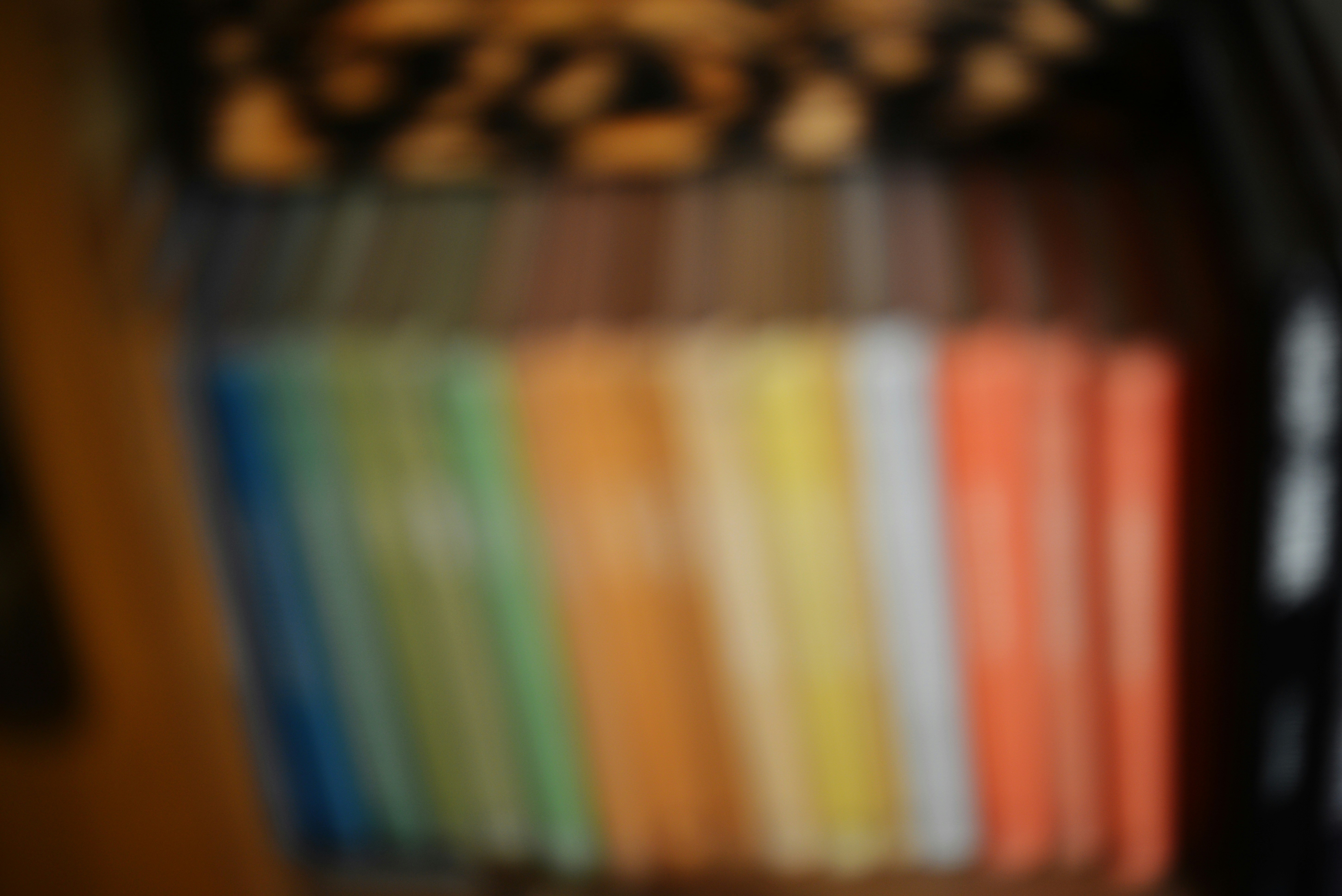 A Spectrum of Knowledge: Colorful Book Spines Await Discovery