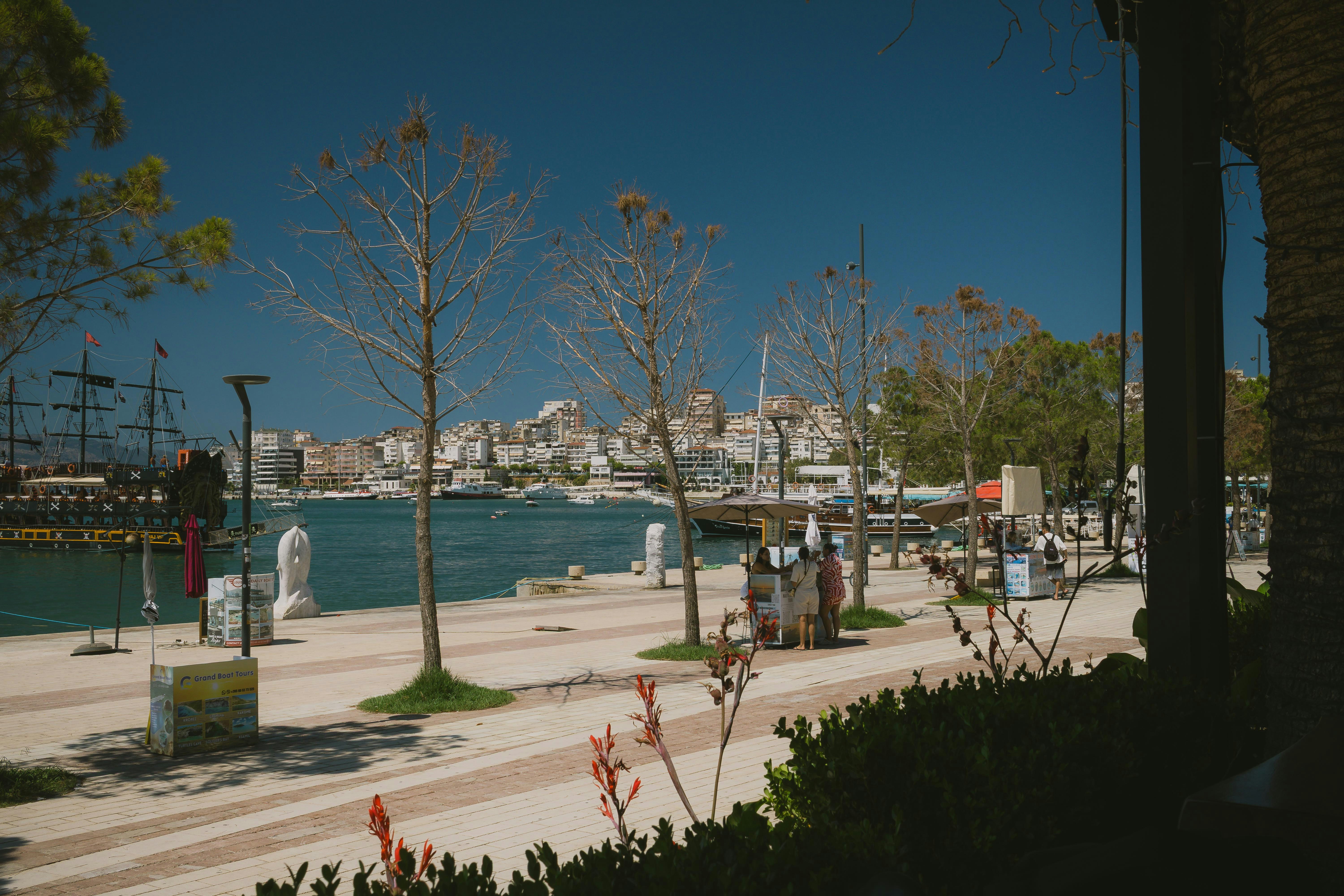 A scenic coastal view with a vibrant blue sky.