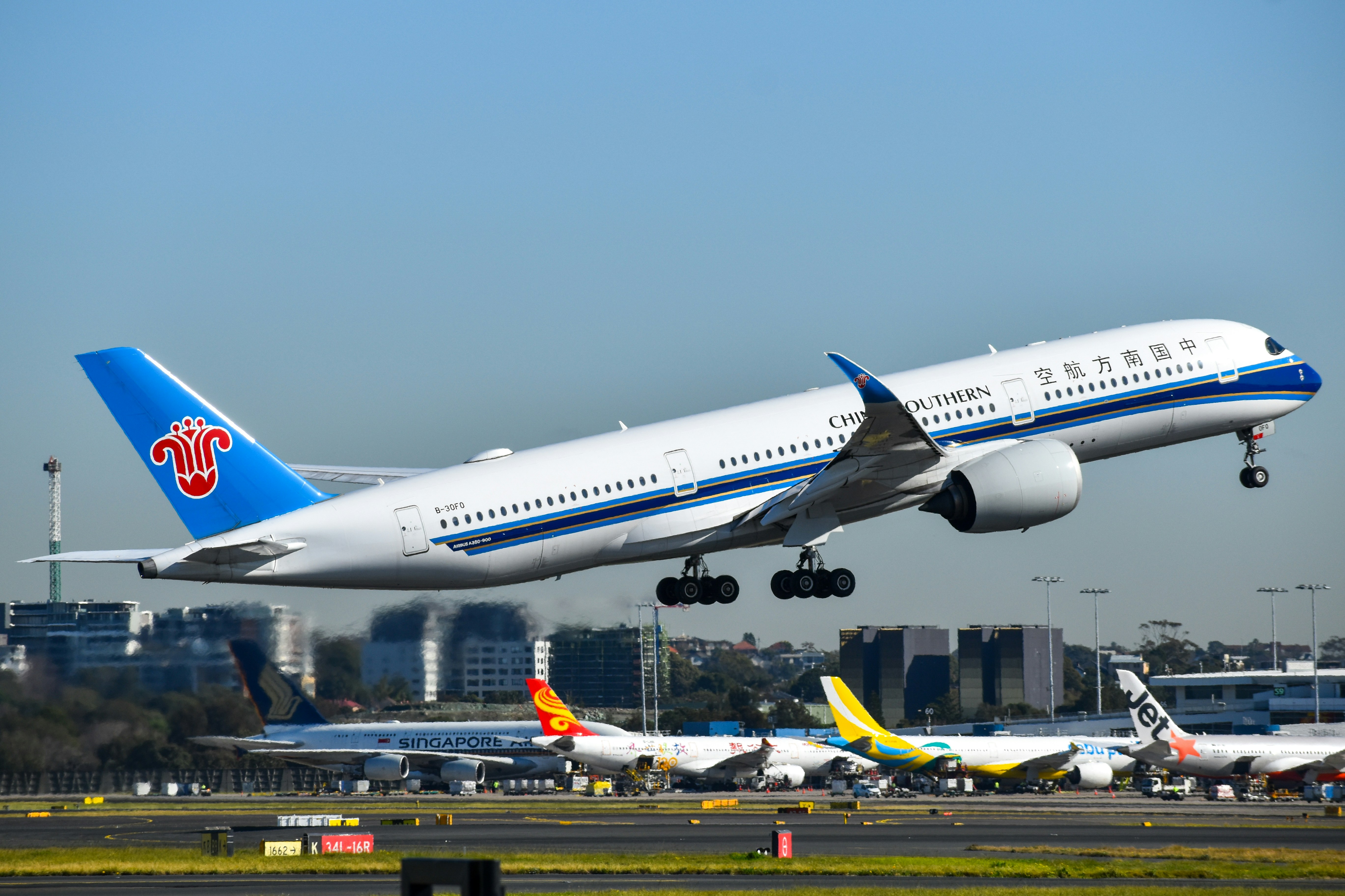 China Southern A350 departing Sydney | A southern china airplane takes off from the runway.