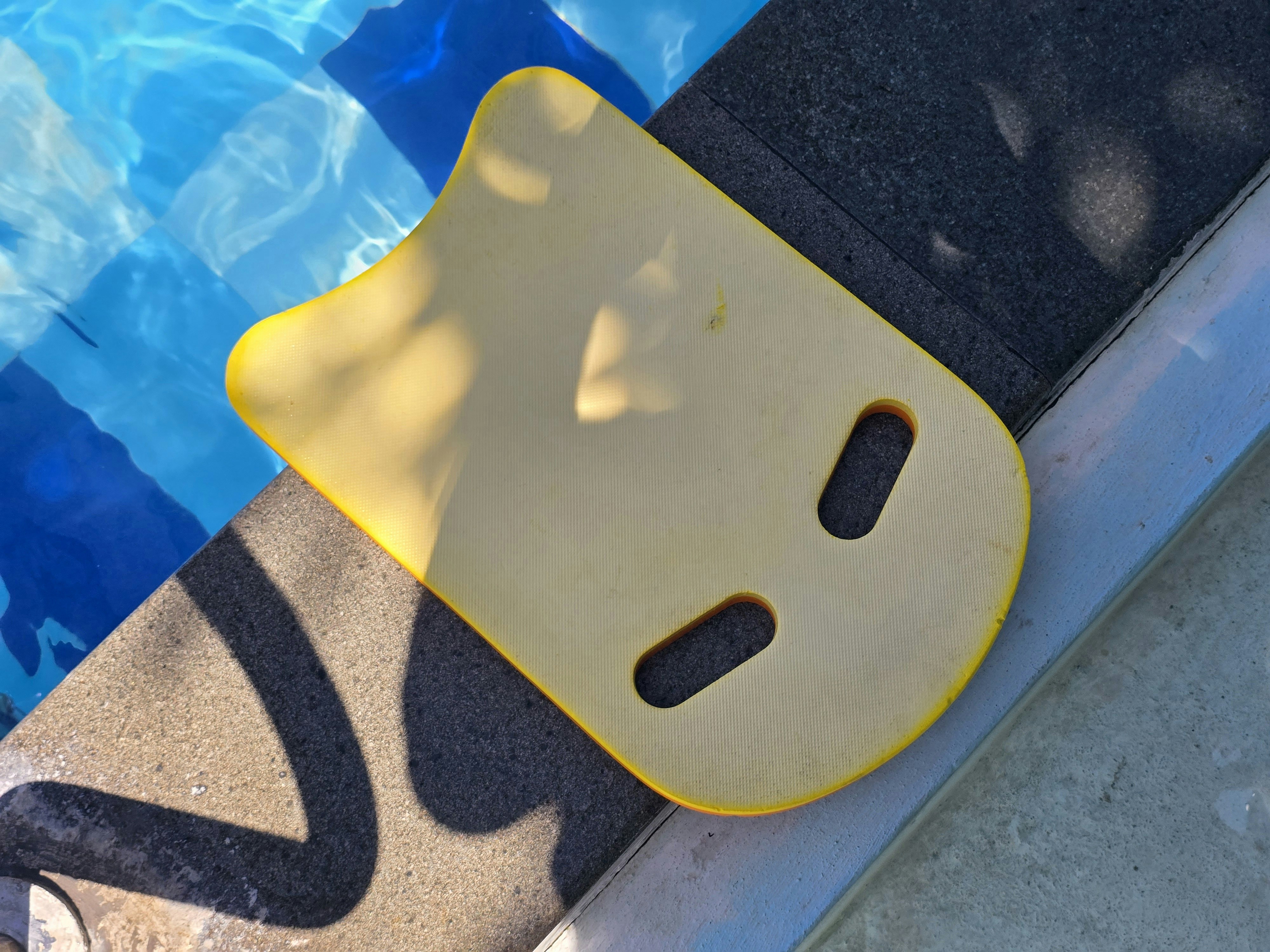 Sunny Respite: A Float's Solitude by the Poolside