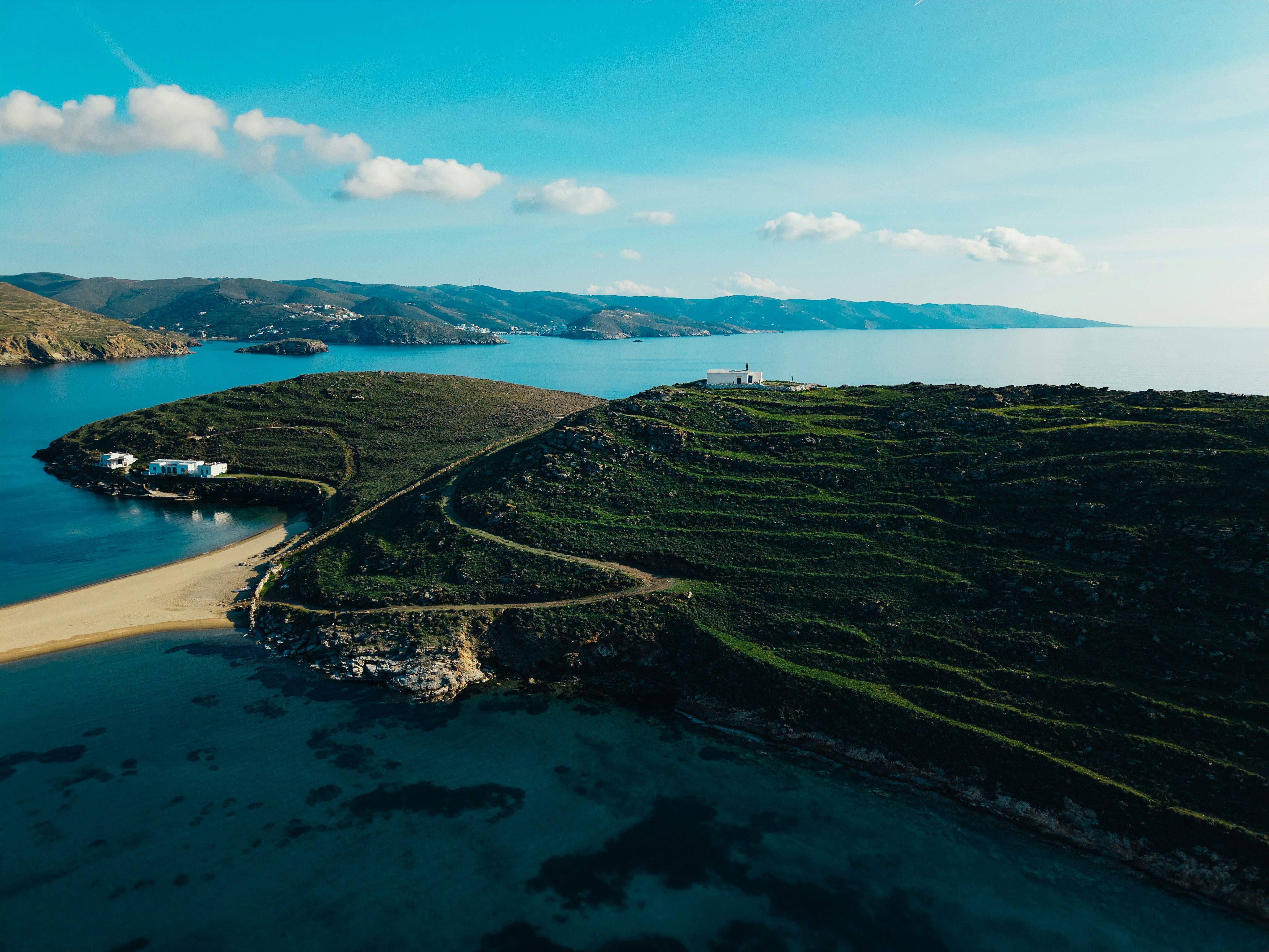 Kolona Beach Kythnos | Sandy beach connects two green islands.