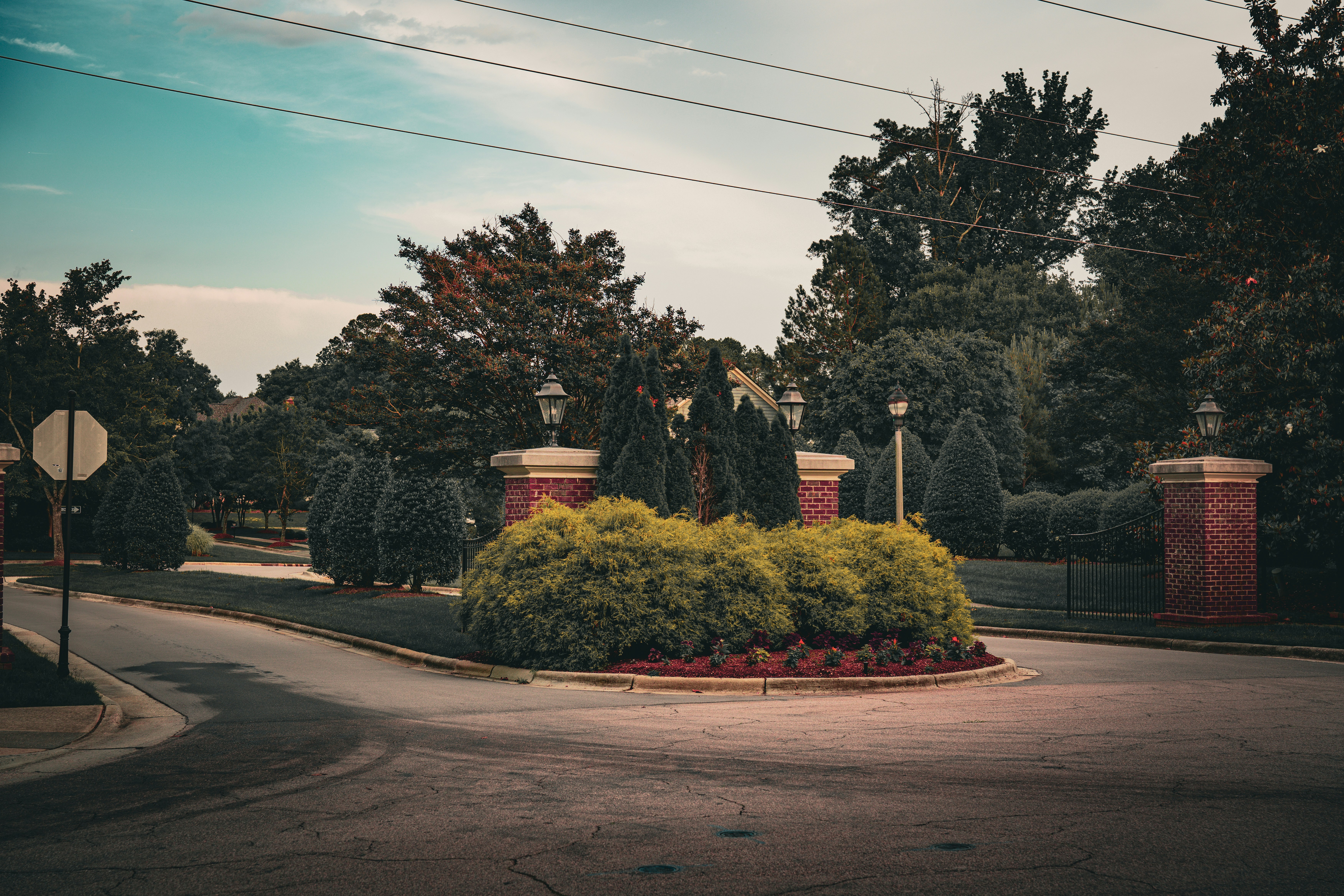 A beautiful street entrance with landscaping.
