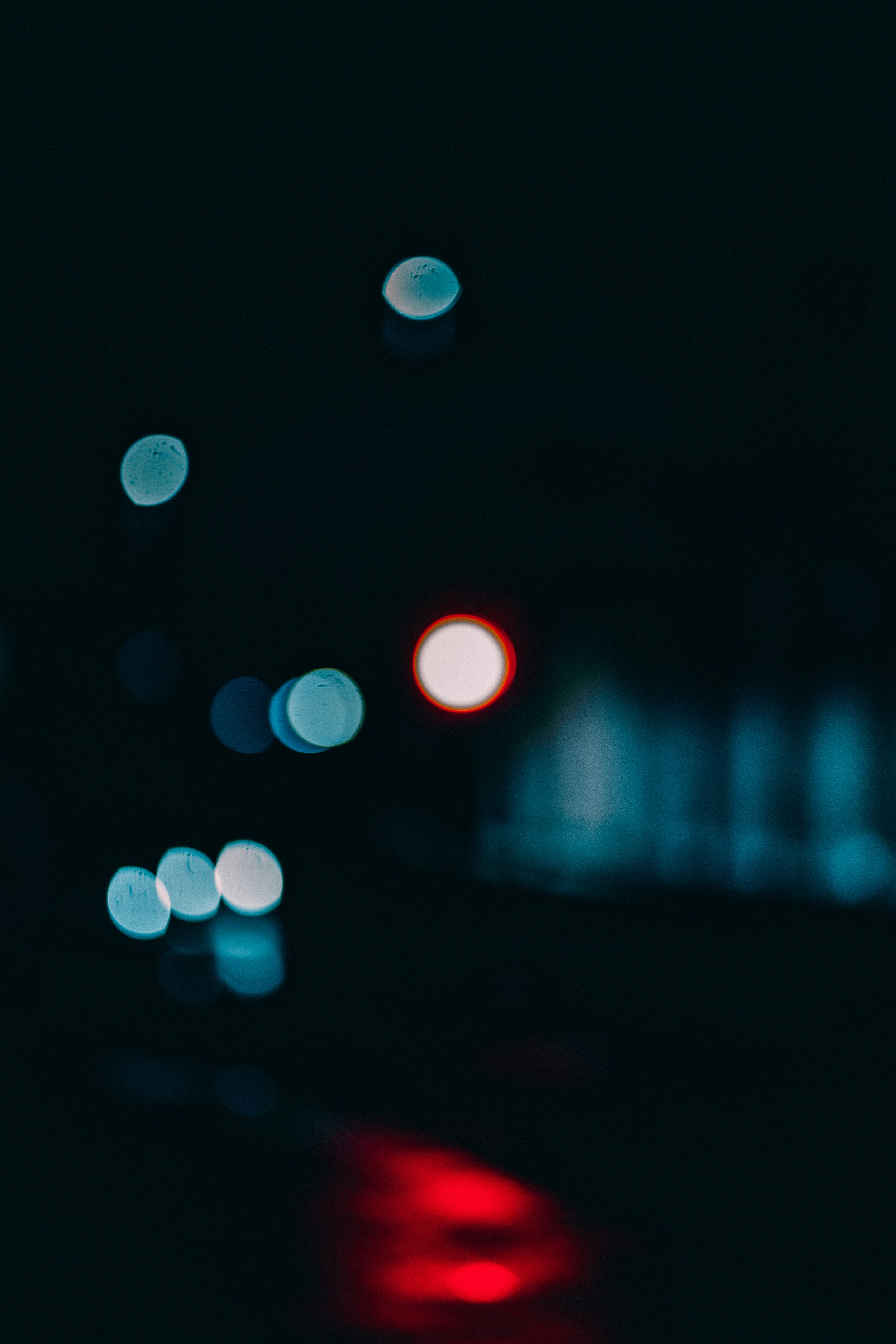 Bokeh lights shimmer against a dark night.