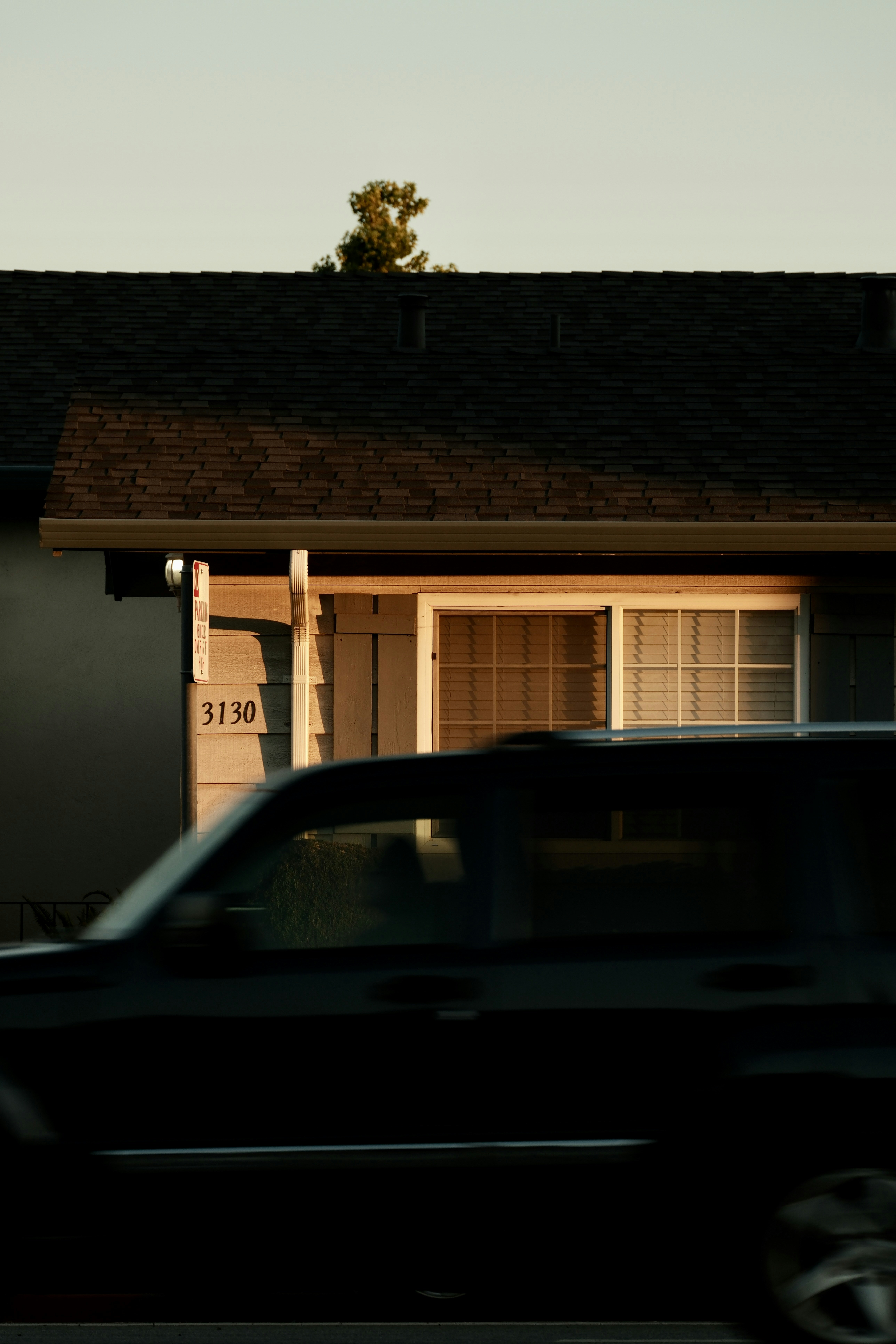 A house is lit with sunlight.