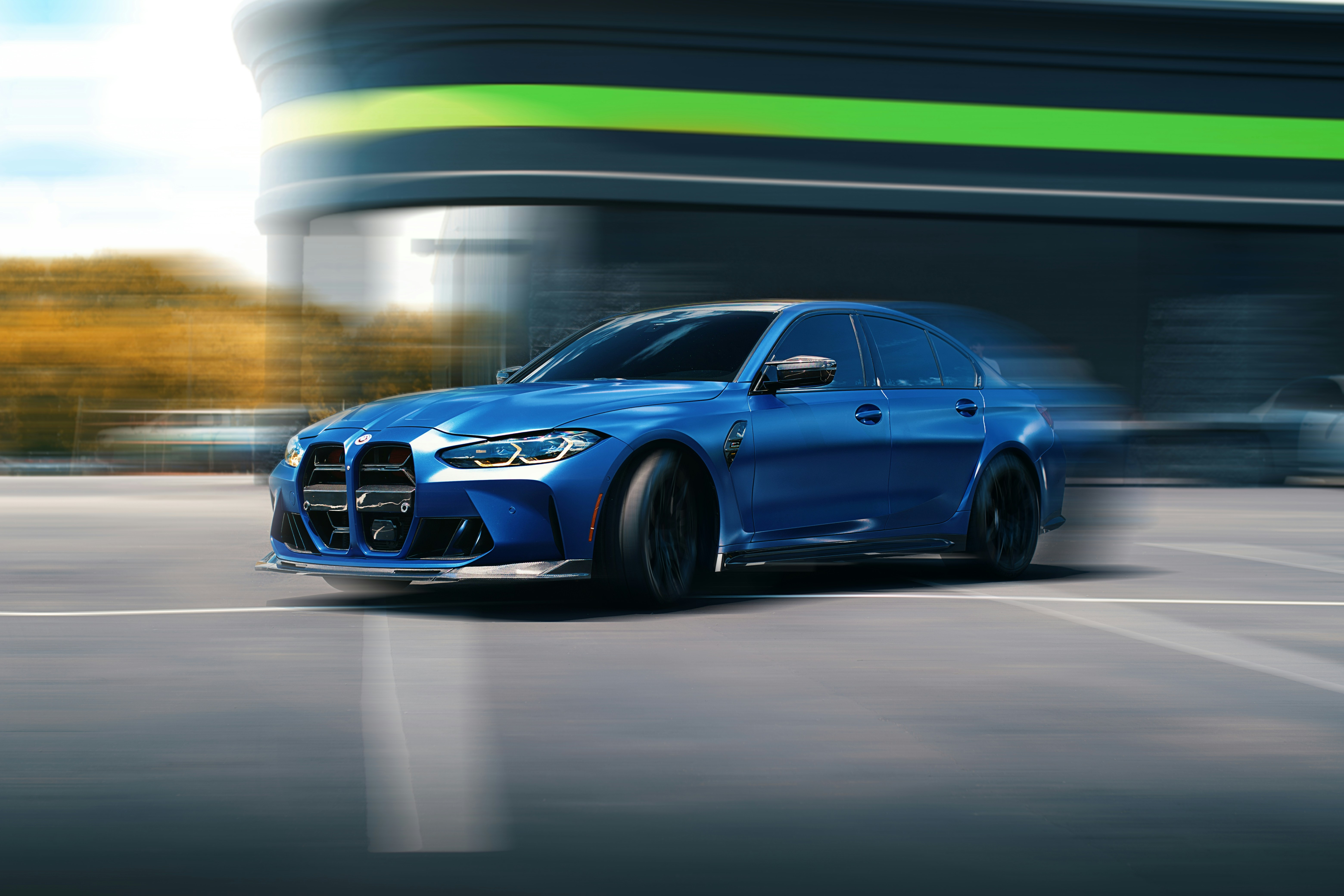 A blue BMW car is driving fast. photo – Free Car Image on Unsplash