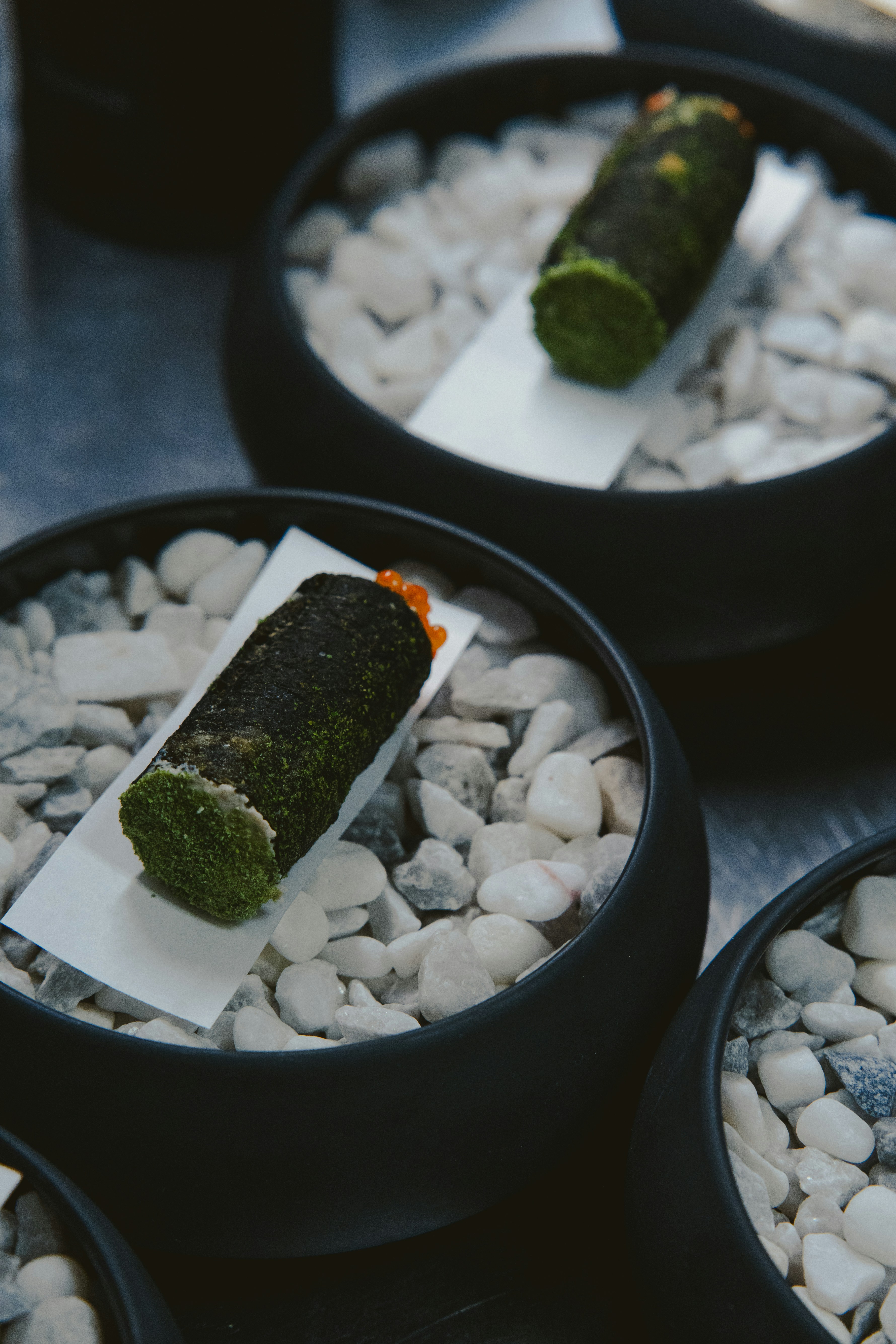 Maki Roll on a Pebble Bed: A Minimal Sushi Still Life