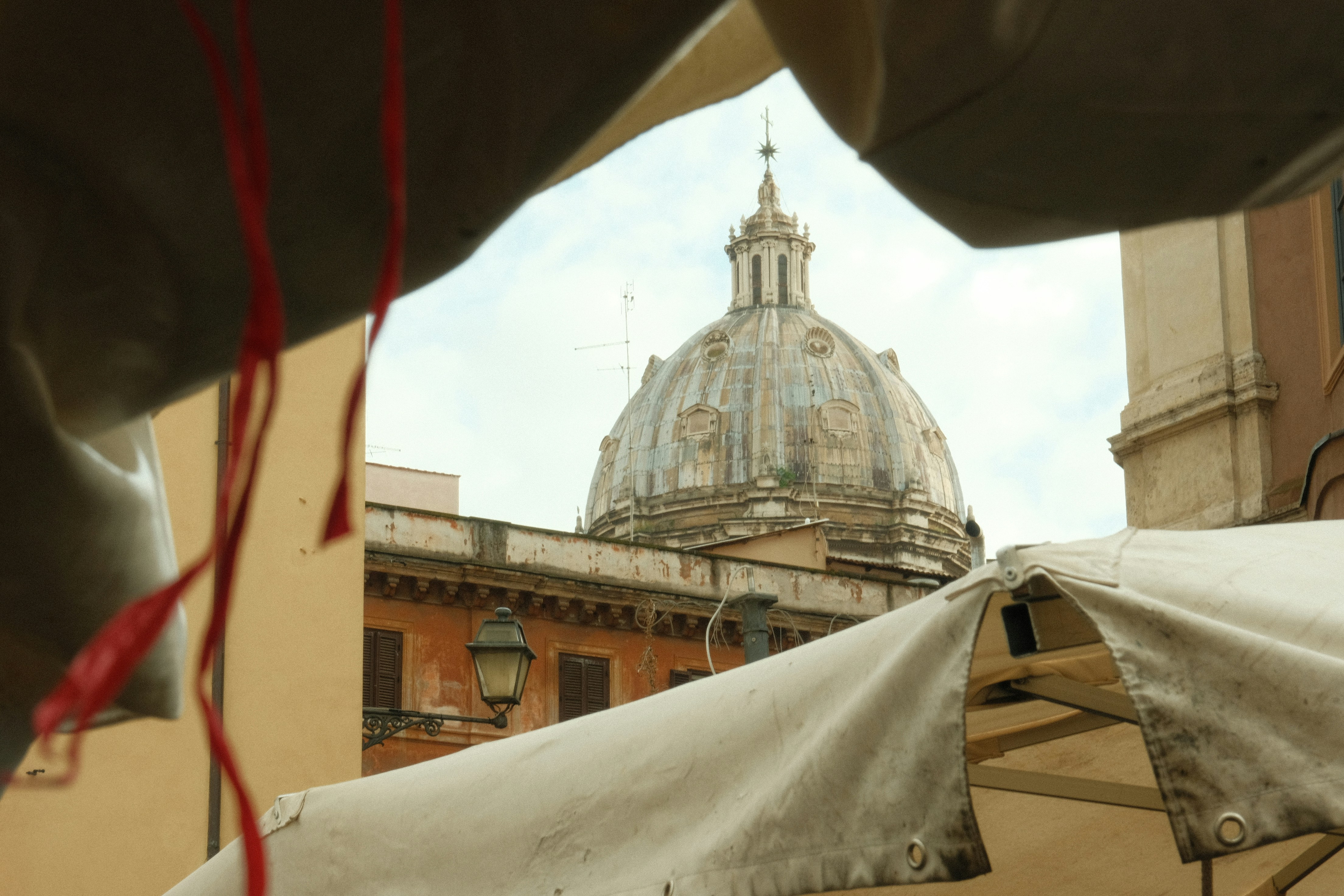 Dome Framed by Canvas: A Quiet City Composition