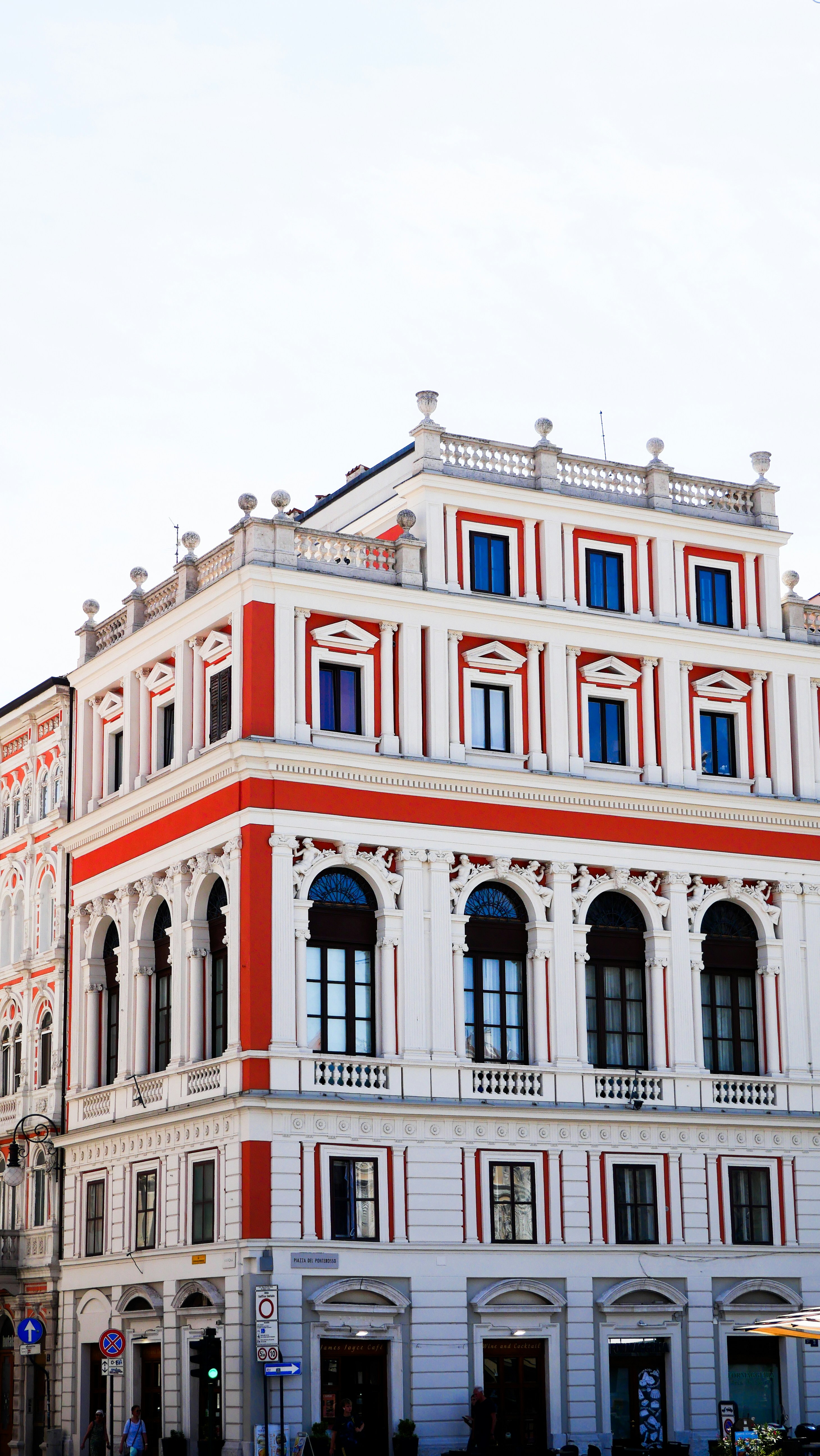 A colorful, ornate building in a city setting.
