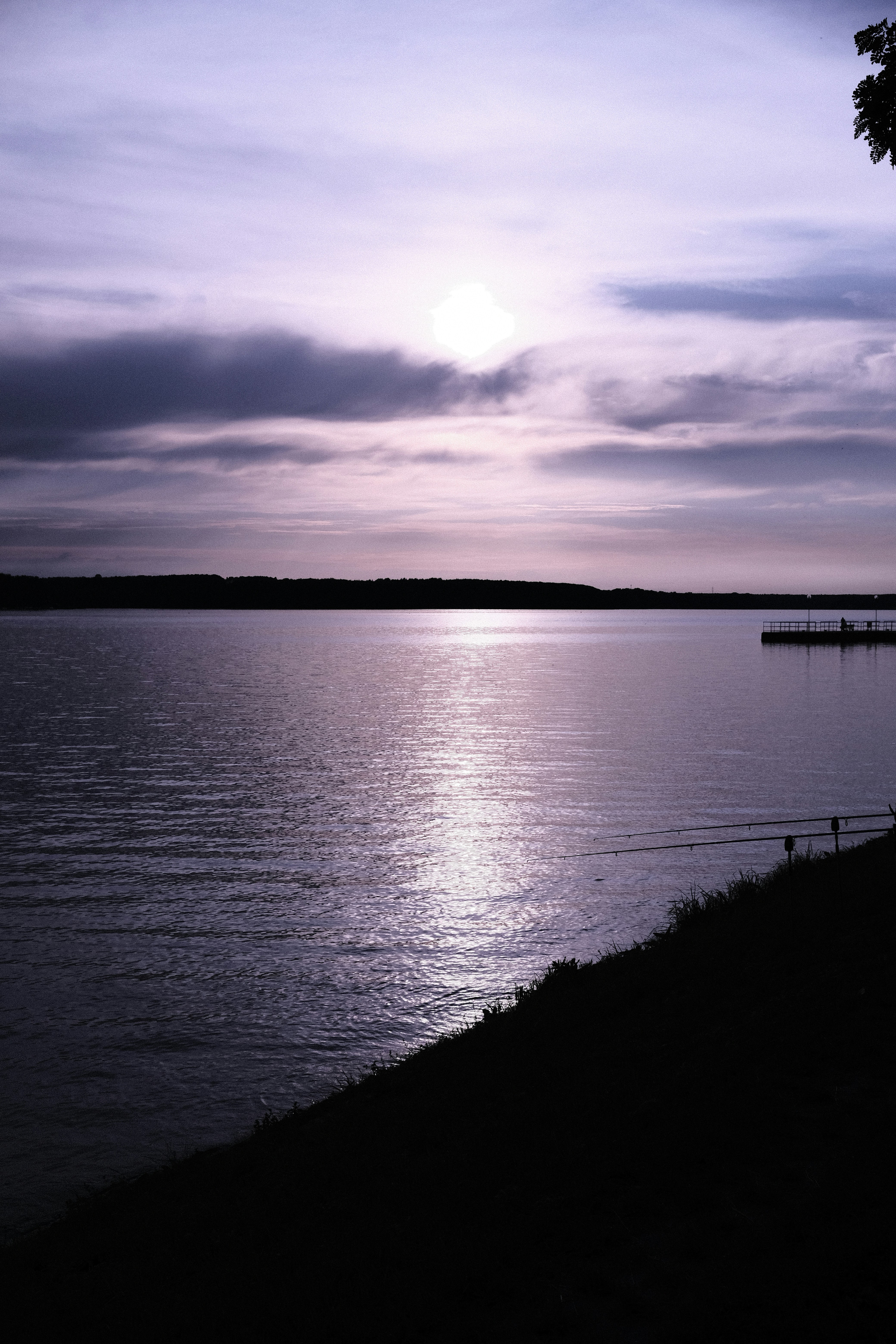 Sunset casts a beautiful reflection on the water.