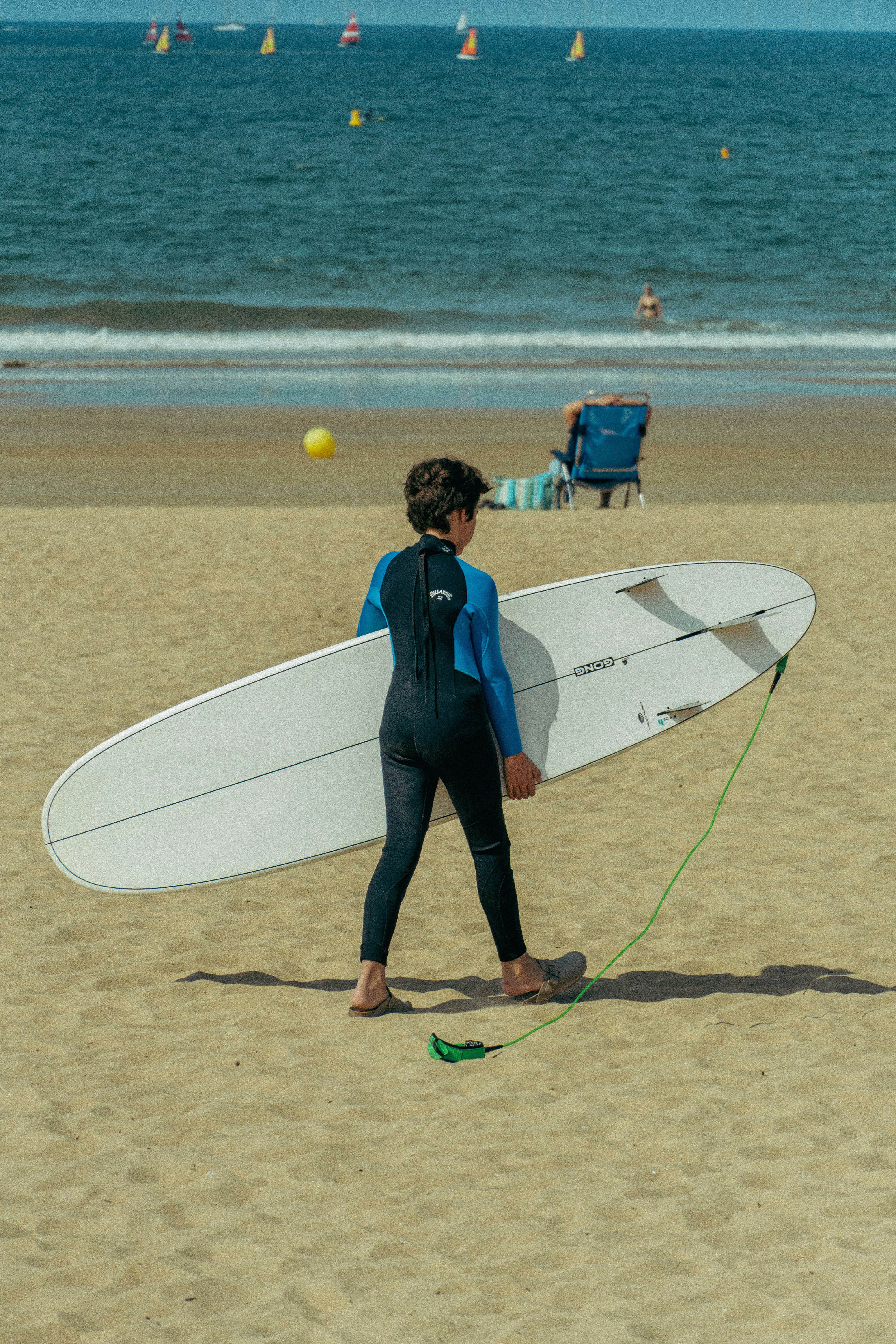 Preparing for the Waves: A Young Surfer's Journey