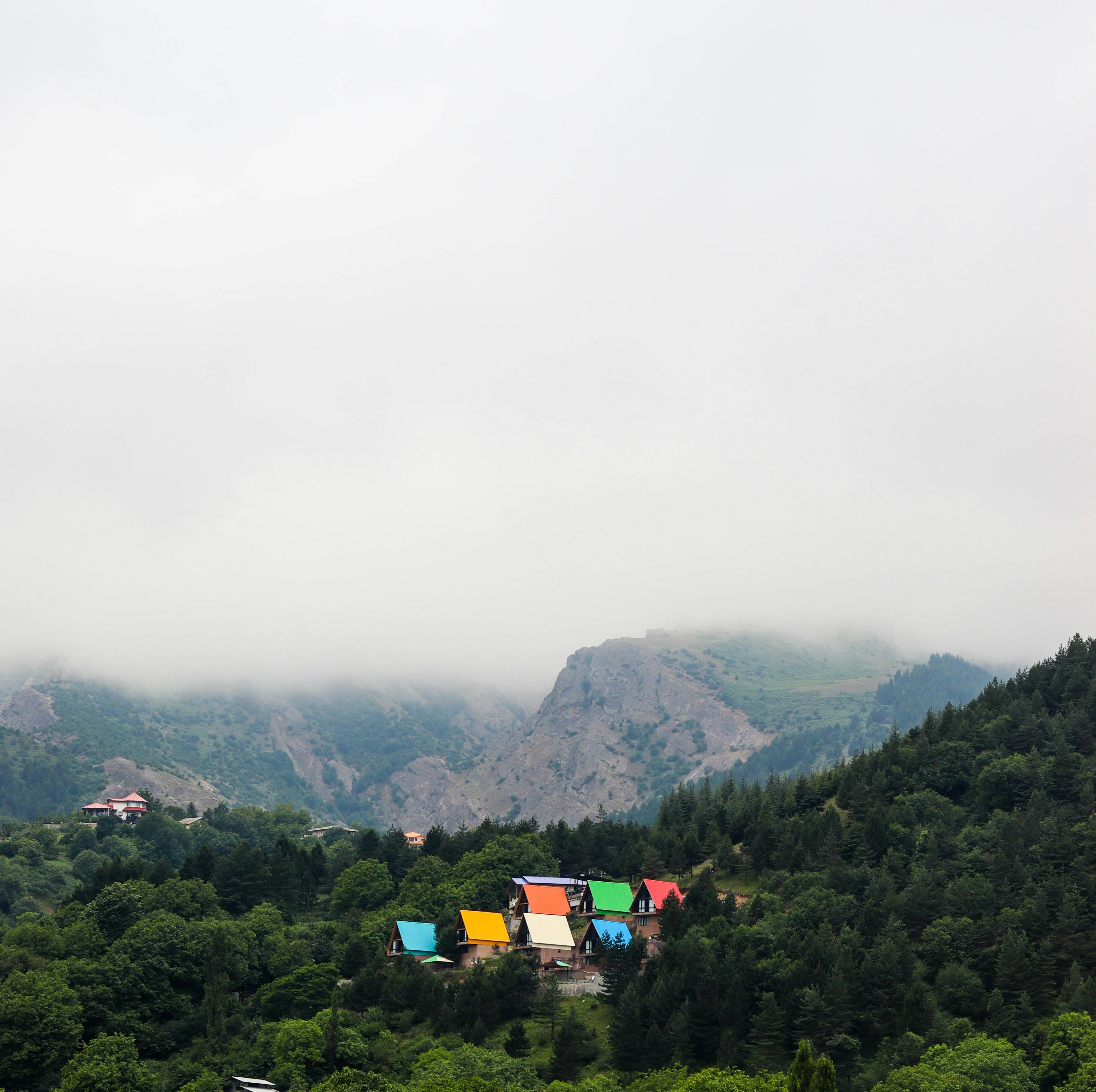 Colorful Abodes Amidst the Misty Mountains