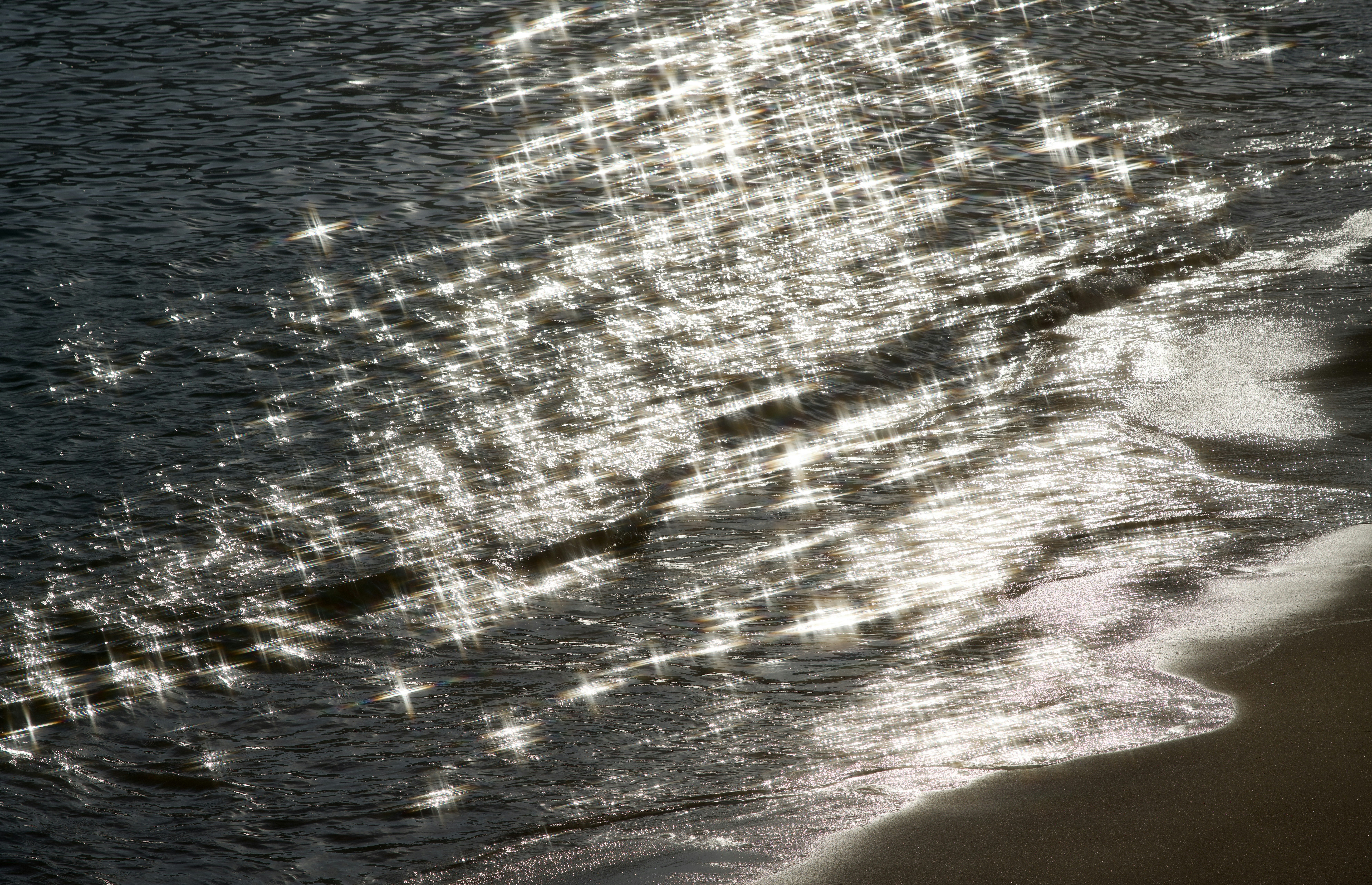 Sunlight shimmers on the ocean's surface. photo – Free Beach Image on ...