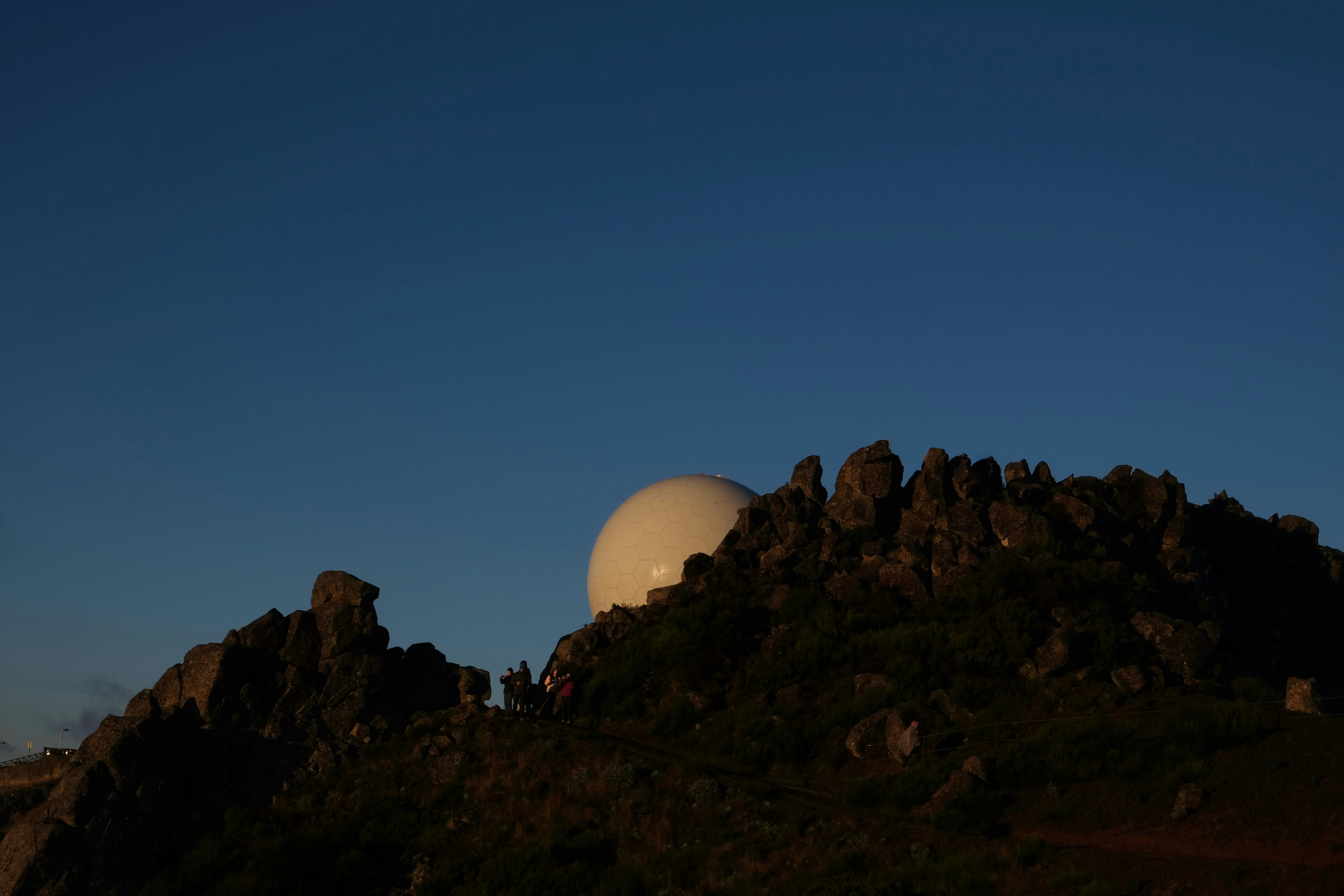 Pico do Arierio | A large white dome sits atop a rocky mountain.