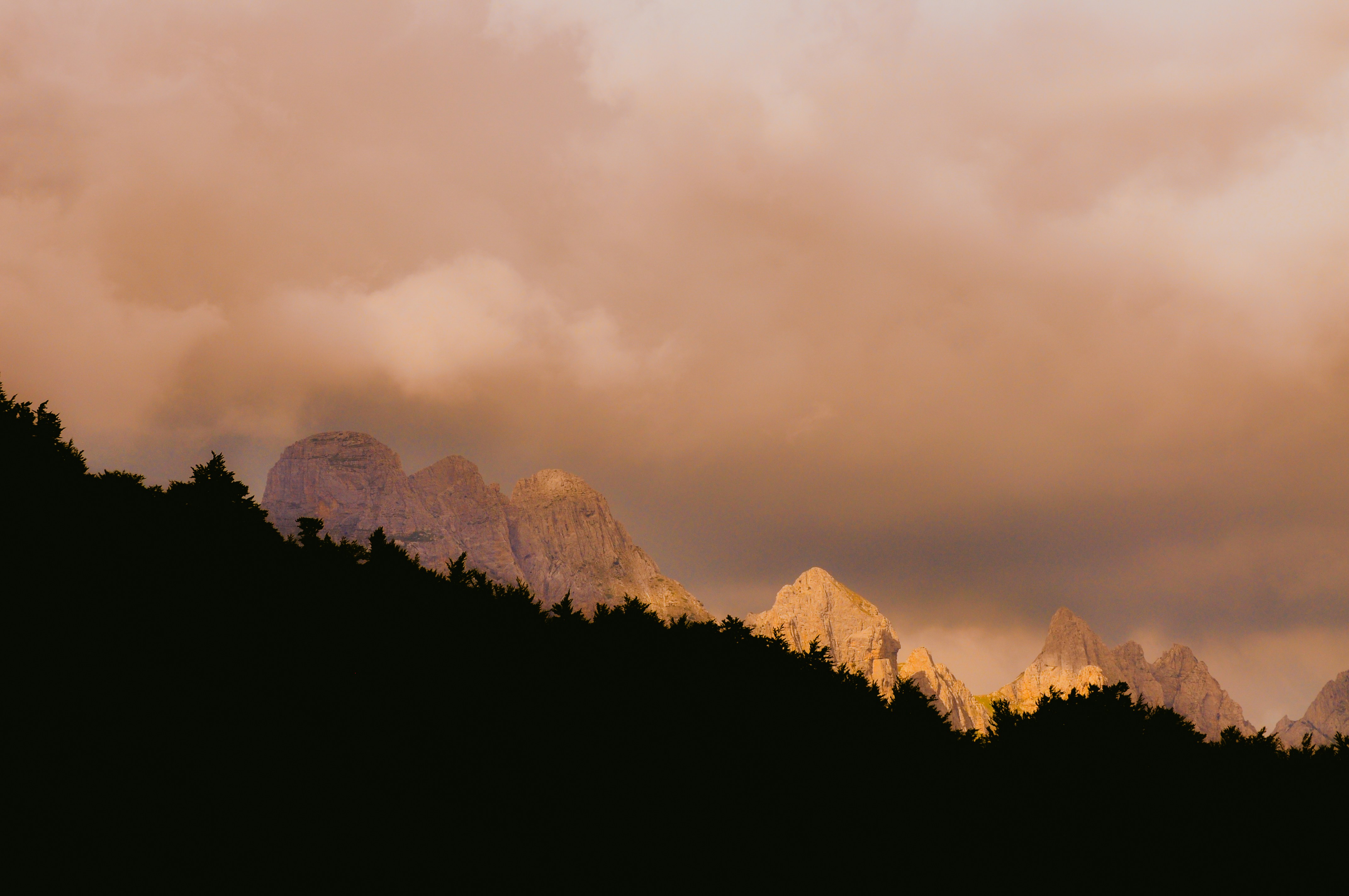 Mountain-scape after the storm | Mountains are illuminated by the setting sun.