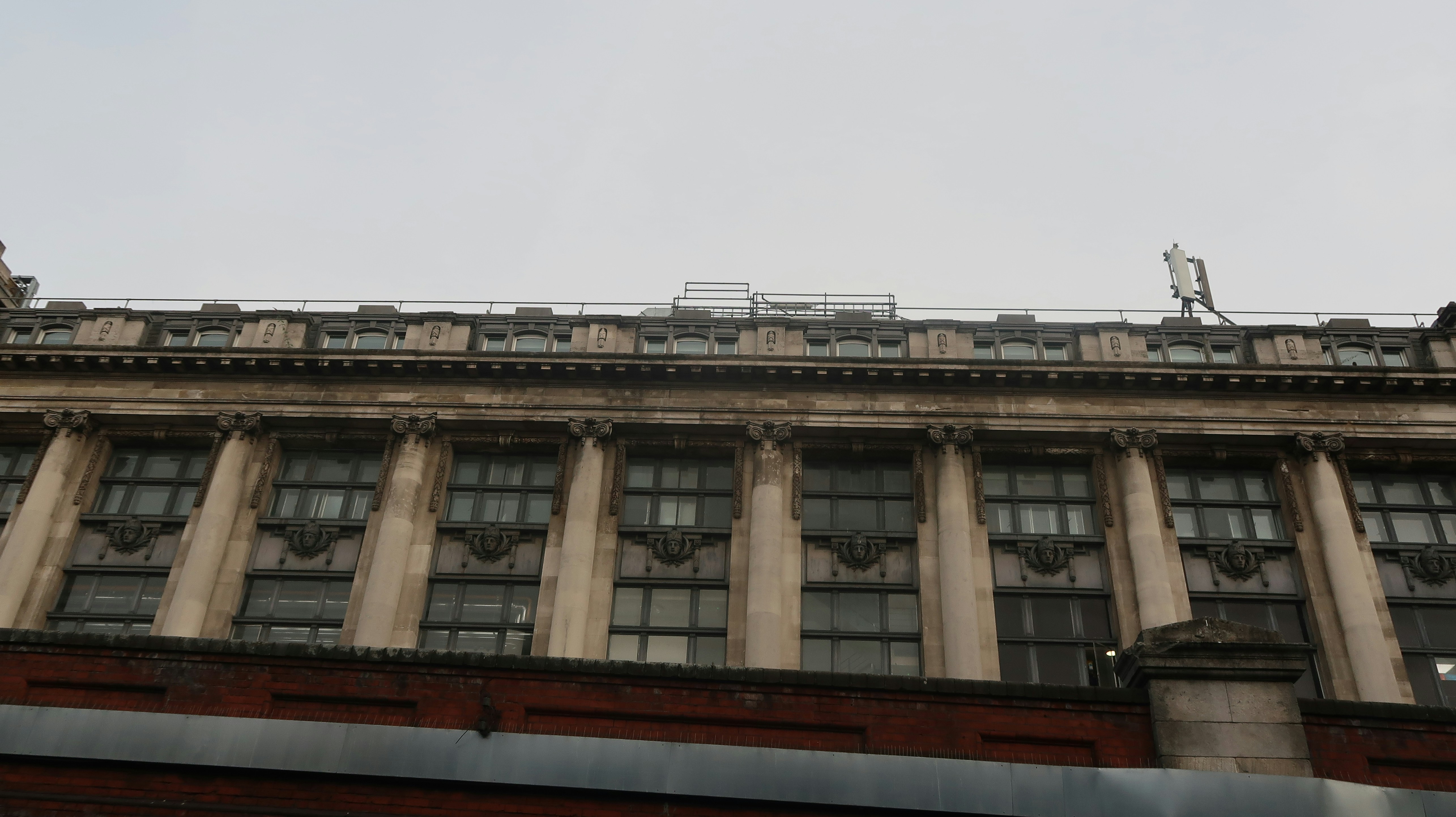 A building with many windows and a detailed facade.