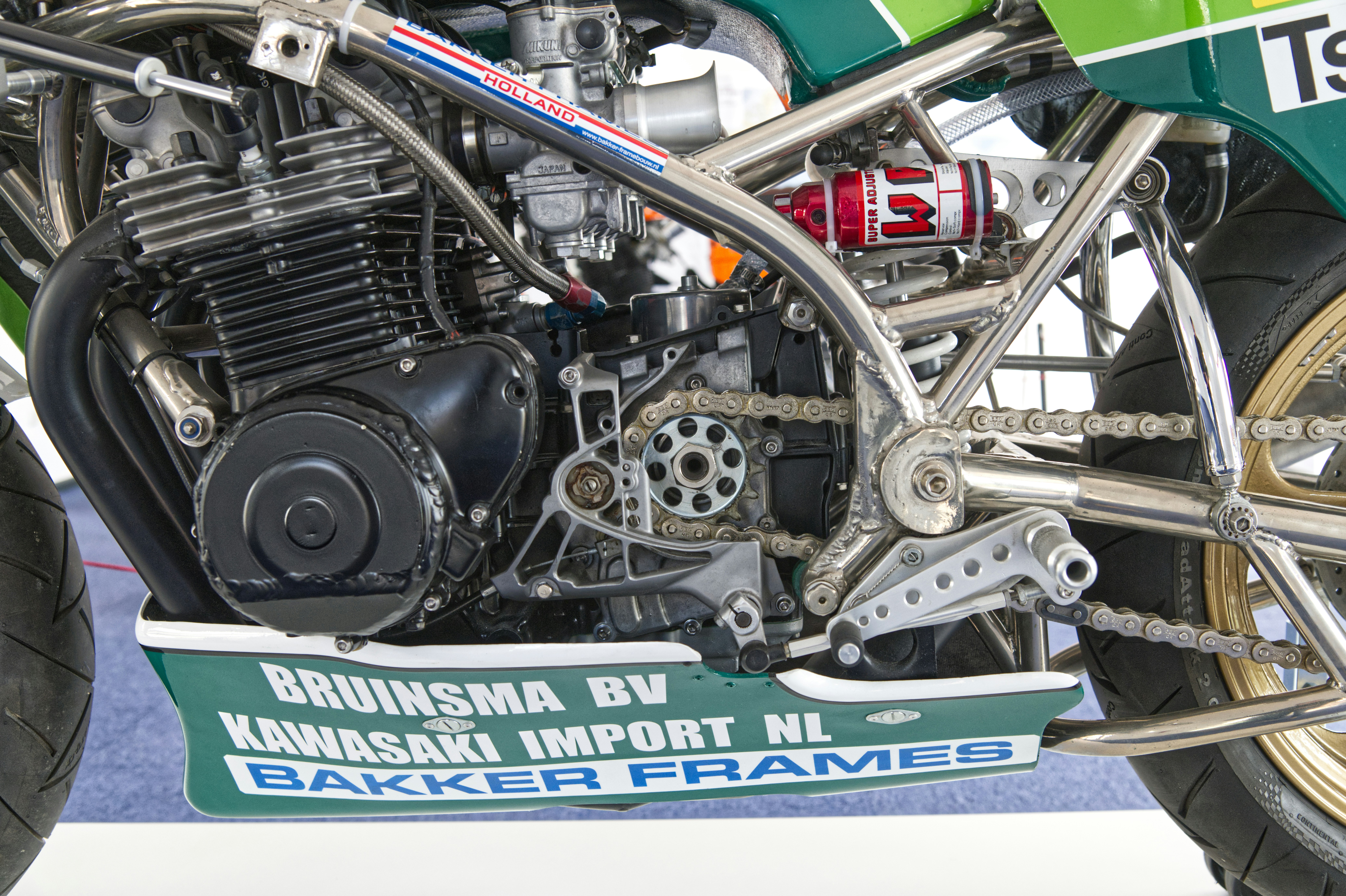 Side view of a vintage kawasaki racing motorcycle.